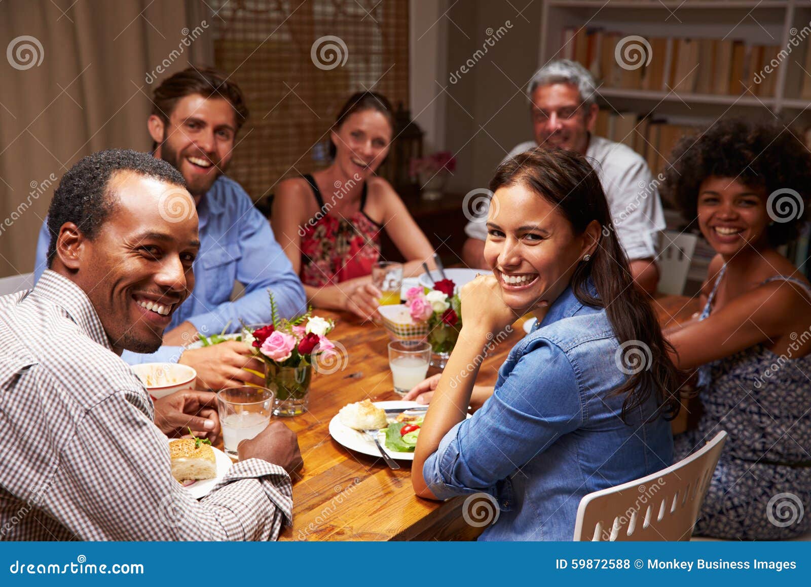 Friends at an Evening Dinner Party, Looking at Camera Stock Photo ...