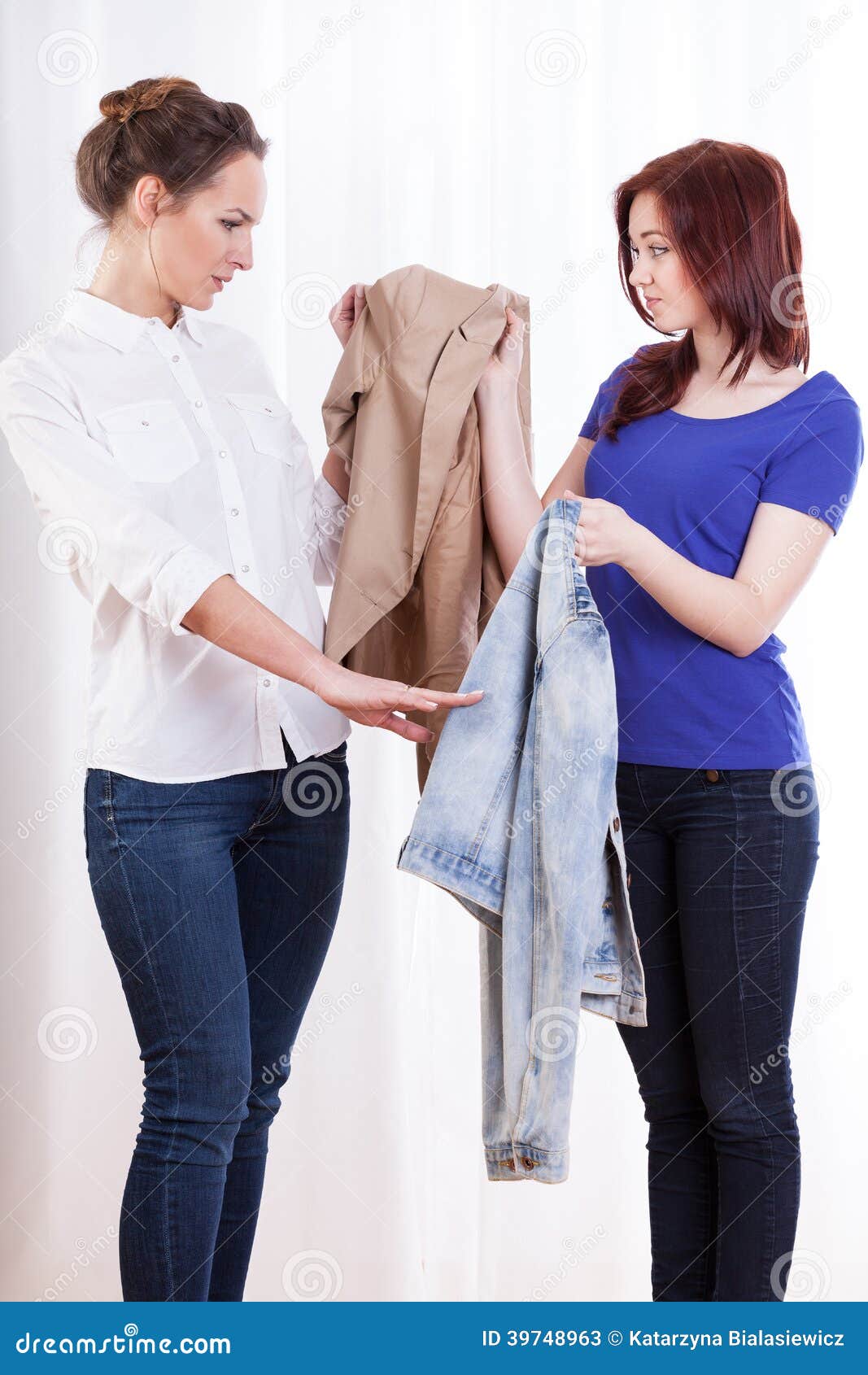 Friends exchanging jackets stock image. Image of shop - 39748963