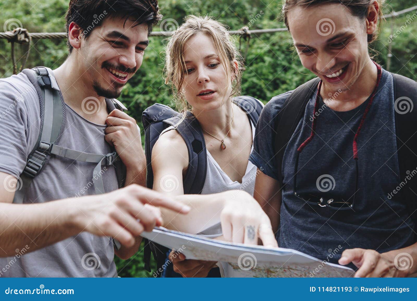 Friends Finding Their Way with a Map Stock Image - Image of looking ...