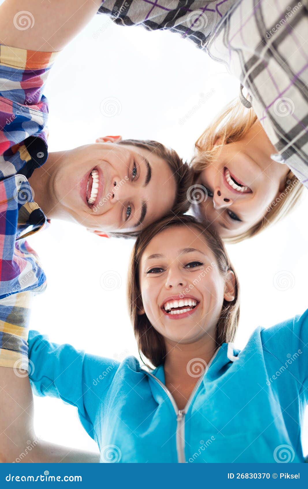 Friends forming a huddle stock photo. Image of girls - 26830370
