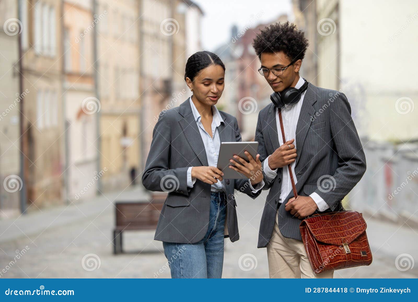 Friends Going Home after Work and Discussing Something Stock Photo ...