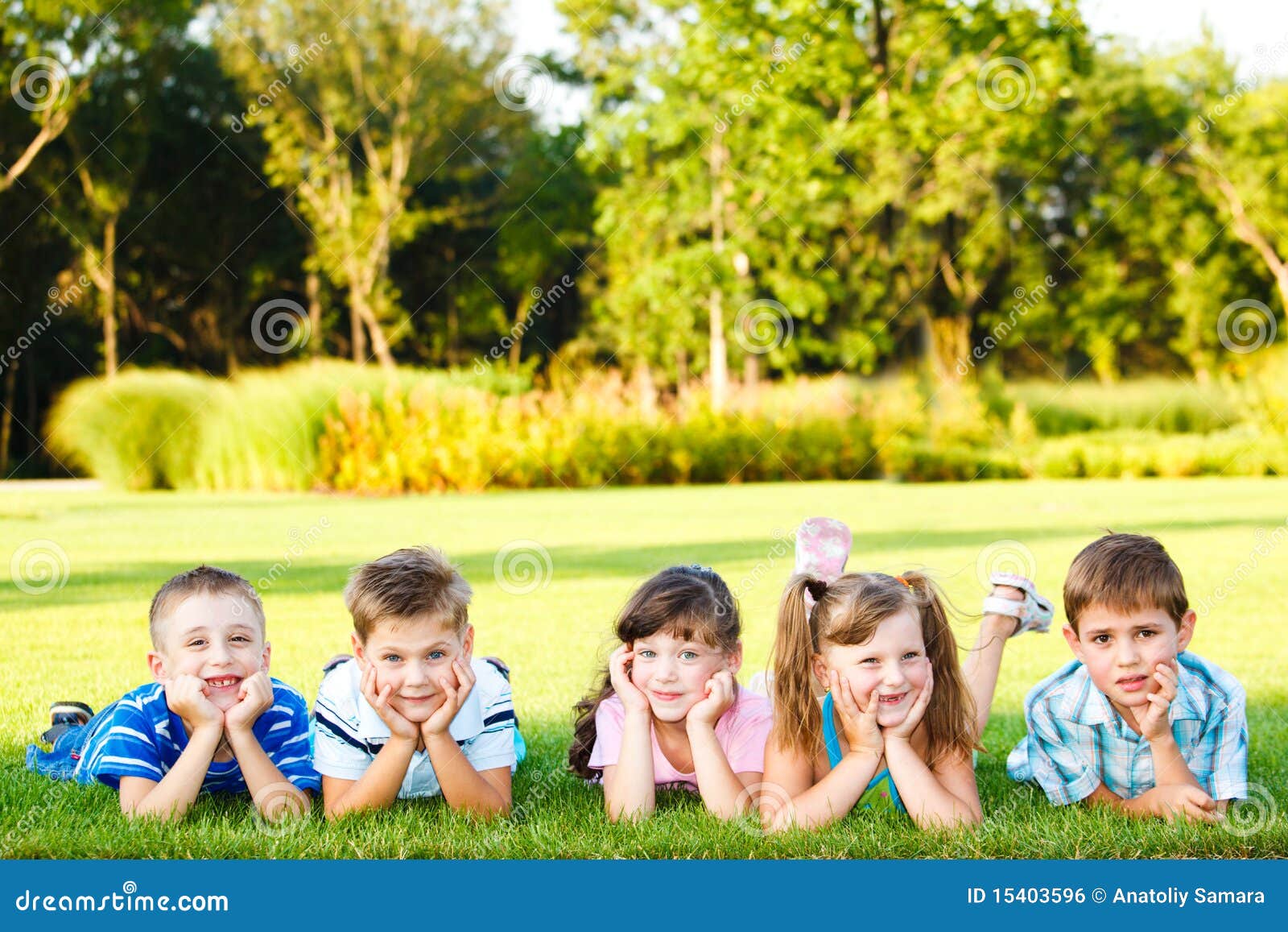 Friends on grass stock photo. Image of garden, girl, beautiful - 15403596