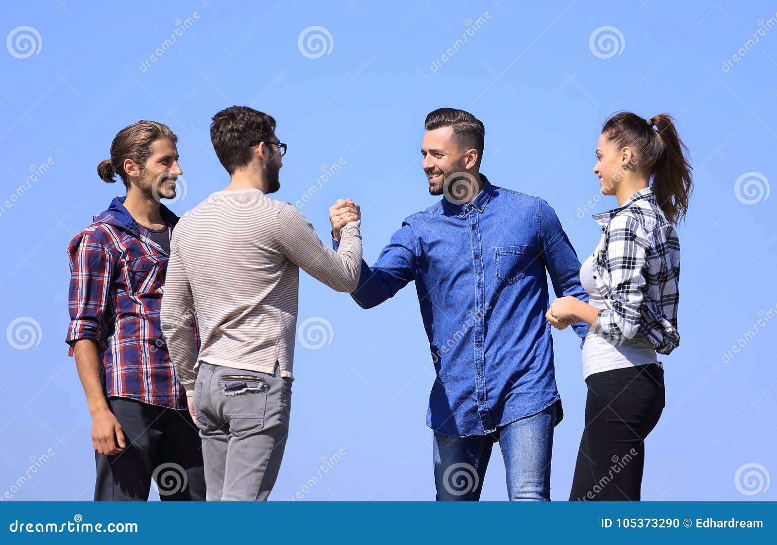 Friends Greet Each Other with a Handshake Stock Photo - Image of ...