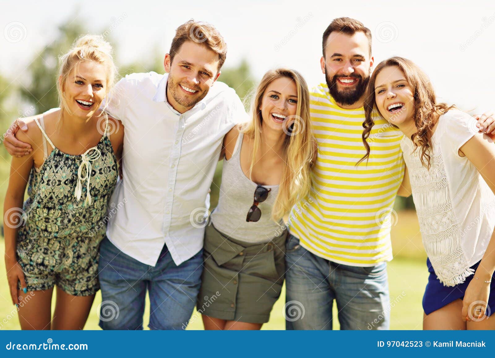 Friends Group Having Fun Together on Grass Stock Image - Image of ...