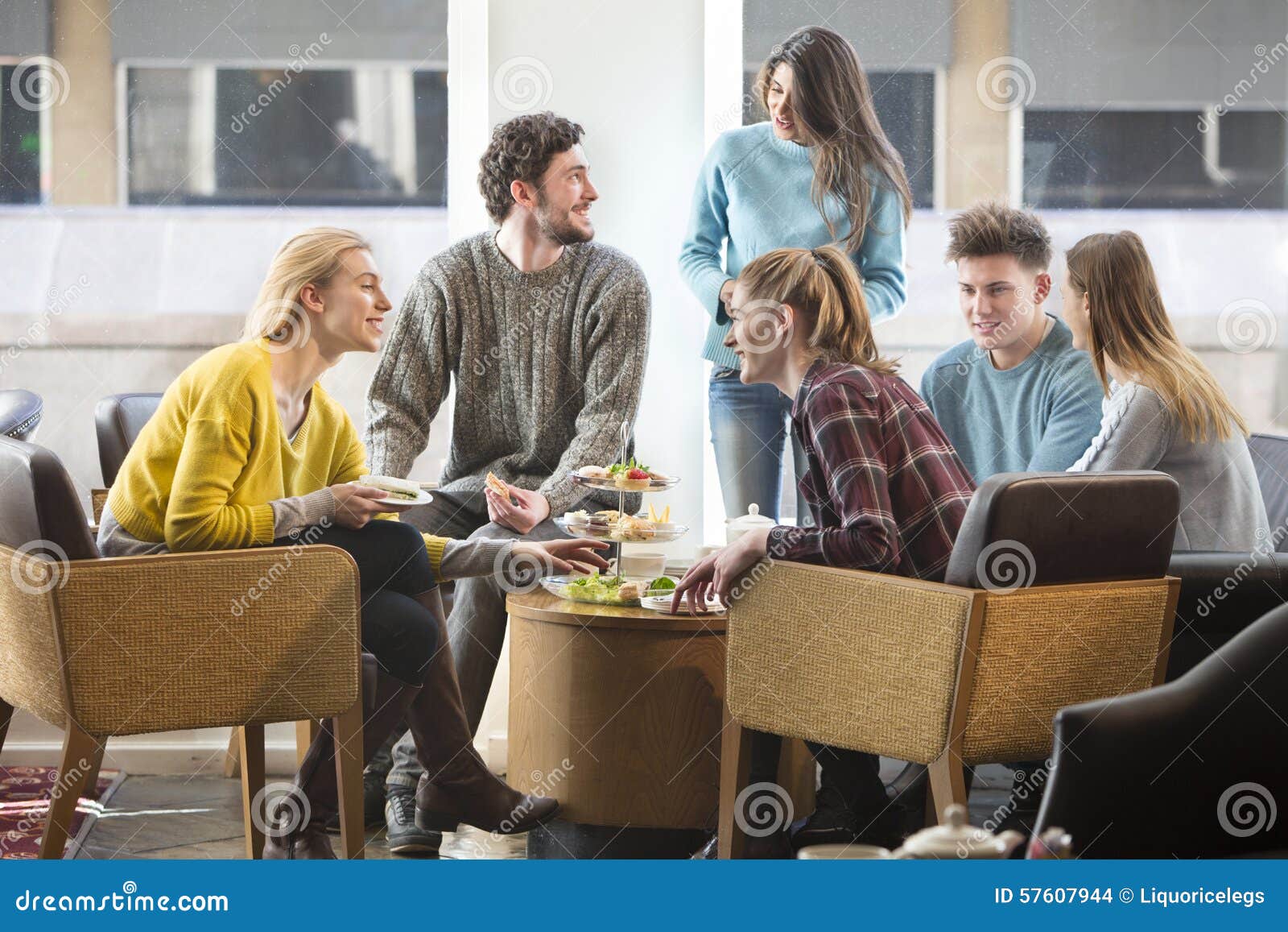 Friends Having Afternoon Tea in a Cafe Stock Photo - Image of snacks ...