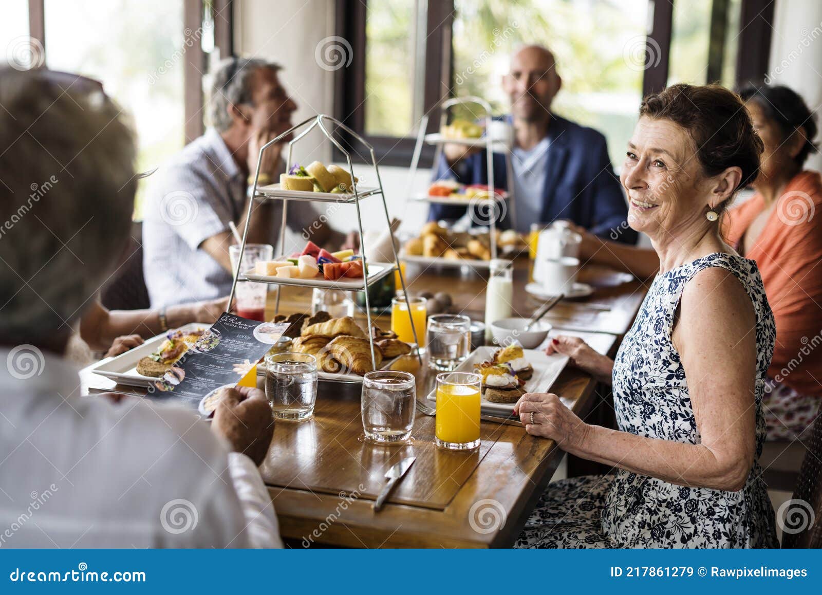 Friends Having Breakfast at a Hotel Stock Image - Image of mature ...
