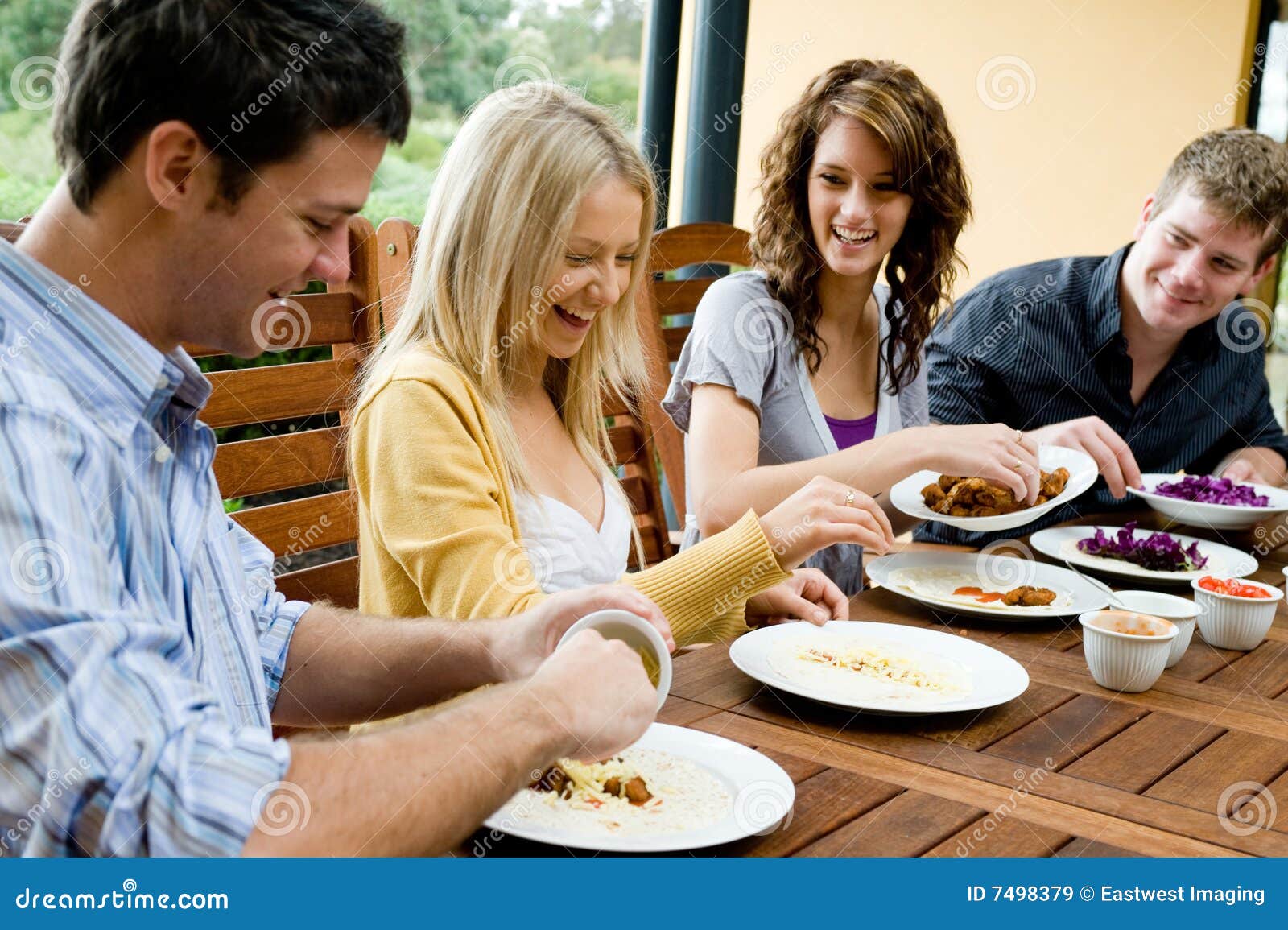 Friends Having Dinner stock image. Image of table, people - 7498379