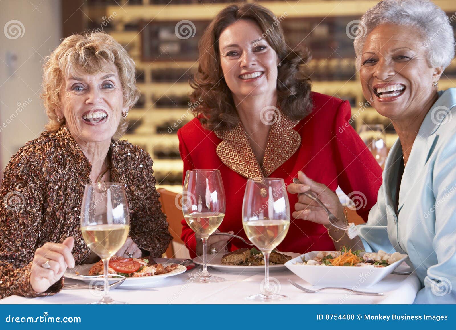 Friends Having Dinner Together at a Restaurant Stock Photo - Image of ...