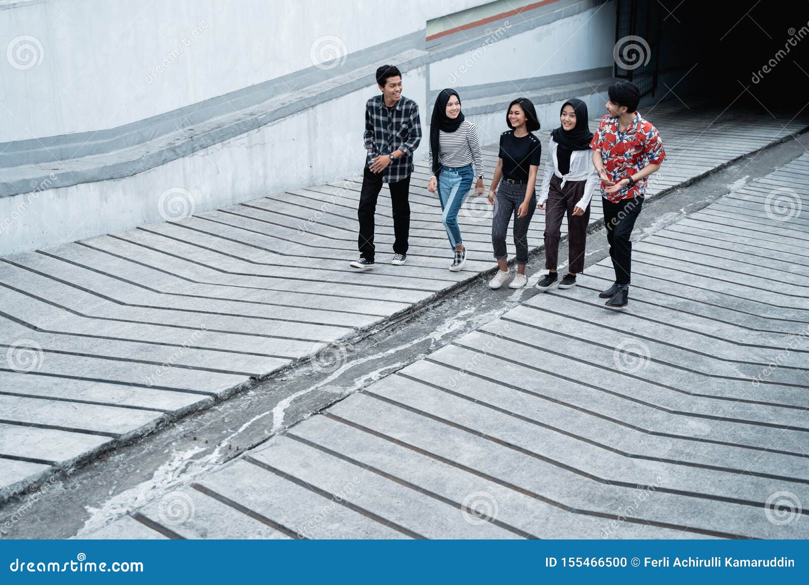 Friends Having Fun Outdoors Walking on the Way Together Stock Photo ...