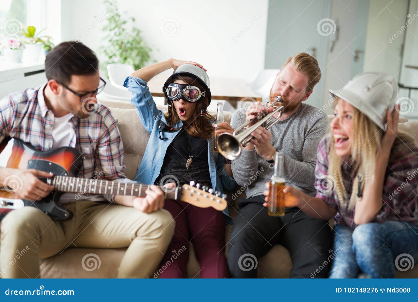 Friends Having Fun and Partying in House and Playing Music Stock Photo ...