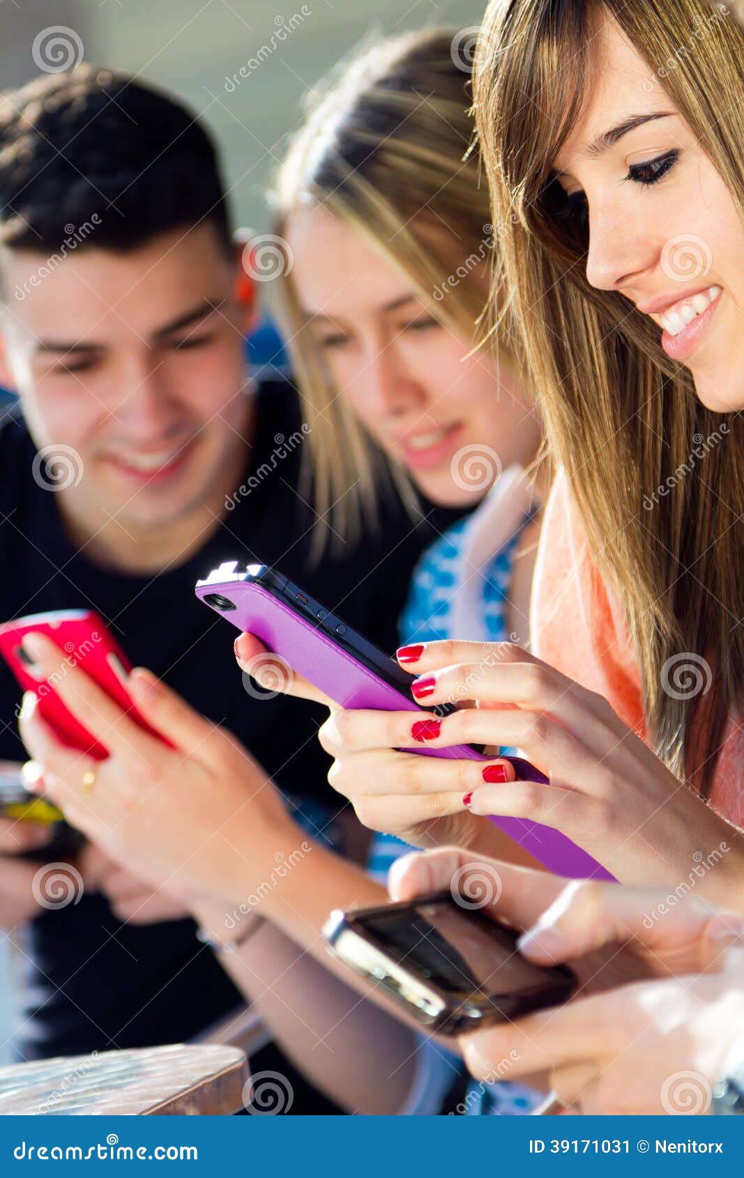 Friends Having Fun with Smartphones Stock Image - Image of attractive ...