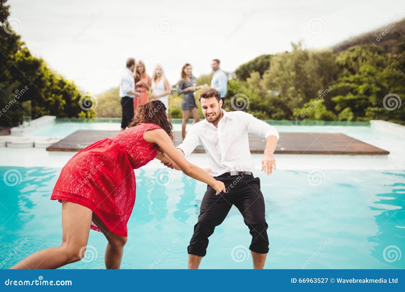Friends Having Fun at Swimming Pool Stock Image - Image of playful ...
