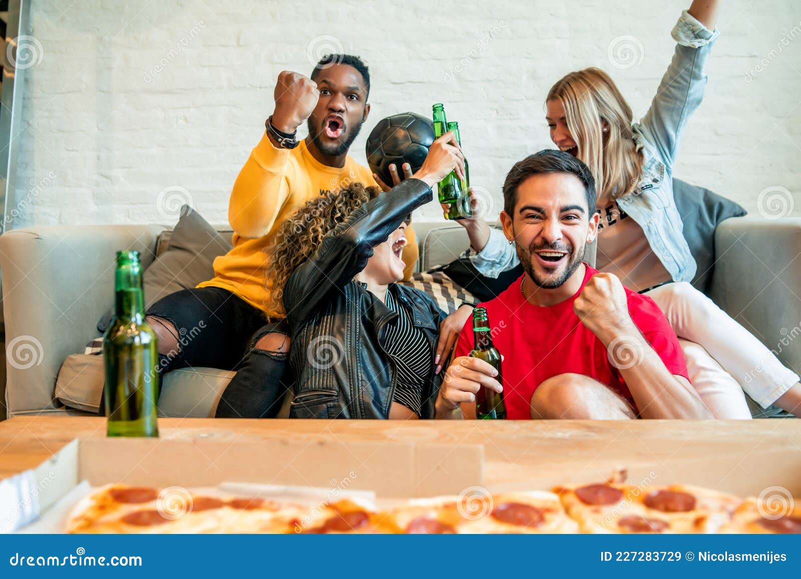 Friends Having Good Time while Watching a Match Together. Stock Image ...