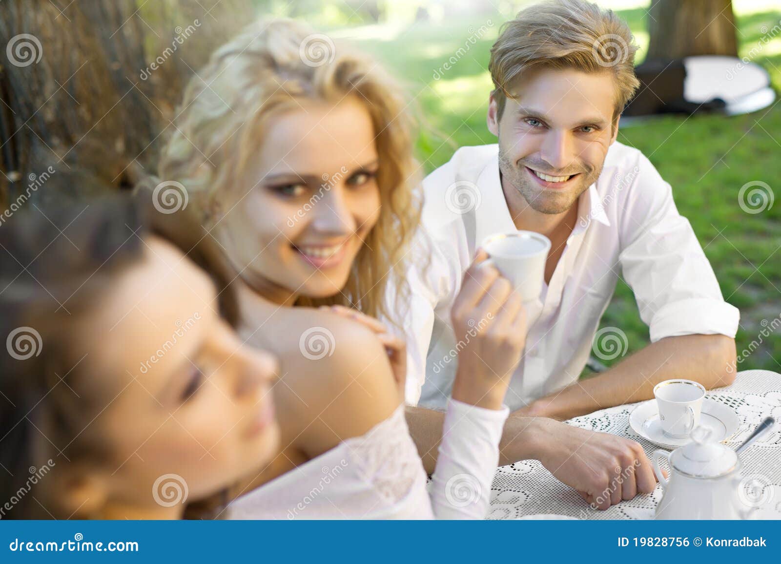 Friends having lunch break stock photo. Image of outside - 19828756