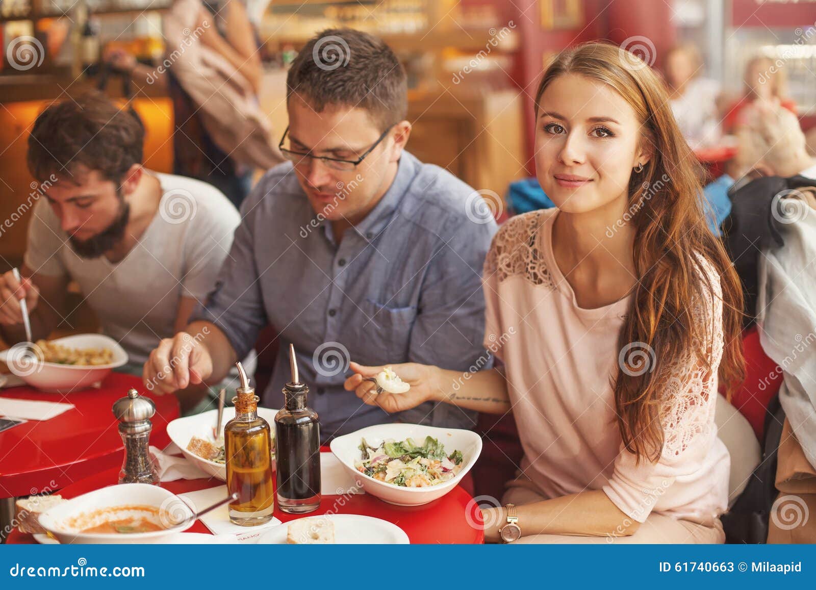 Friends having lunch stock image. Image of eating, lifestyle - 61740663