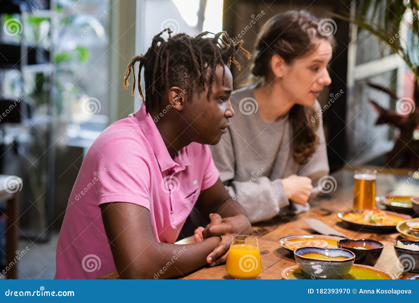 Friends Having a Lunch Together at a Modern Restaurant Stock Photo ...