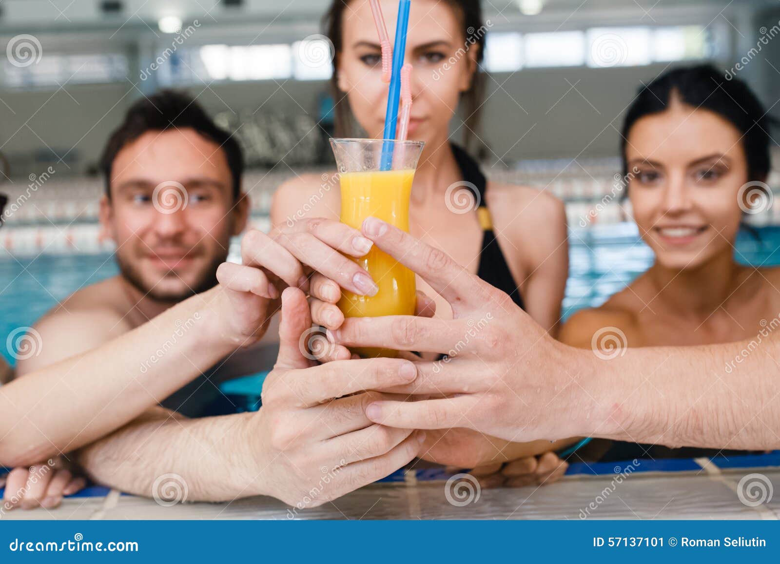 Friends Having Party and Drinking Buckets at a Swimming Pool Stock ...