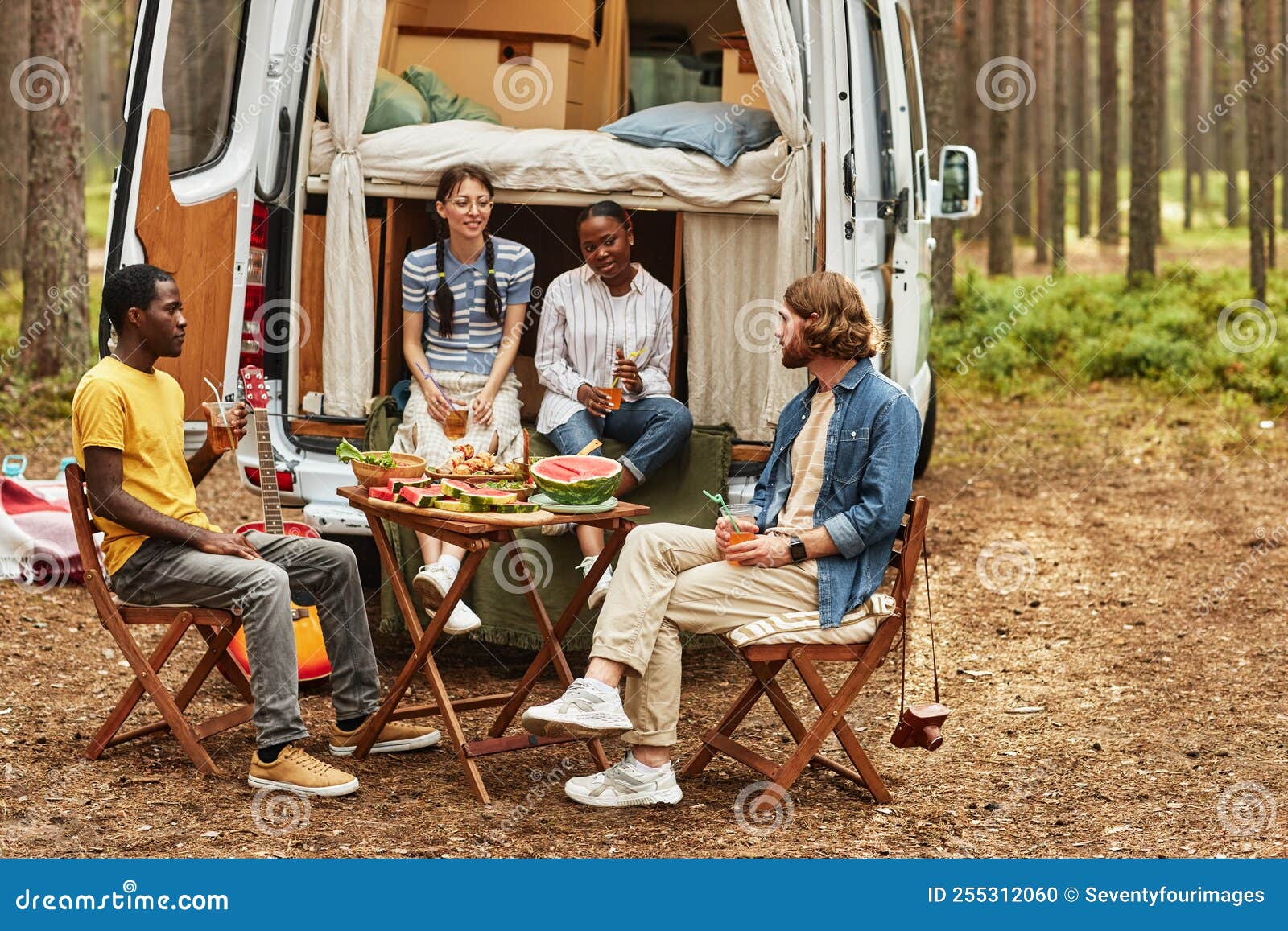 Friends Having Picnic during Camping in Motorhome Stock Photo - Image ...