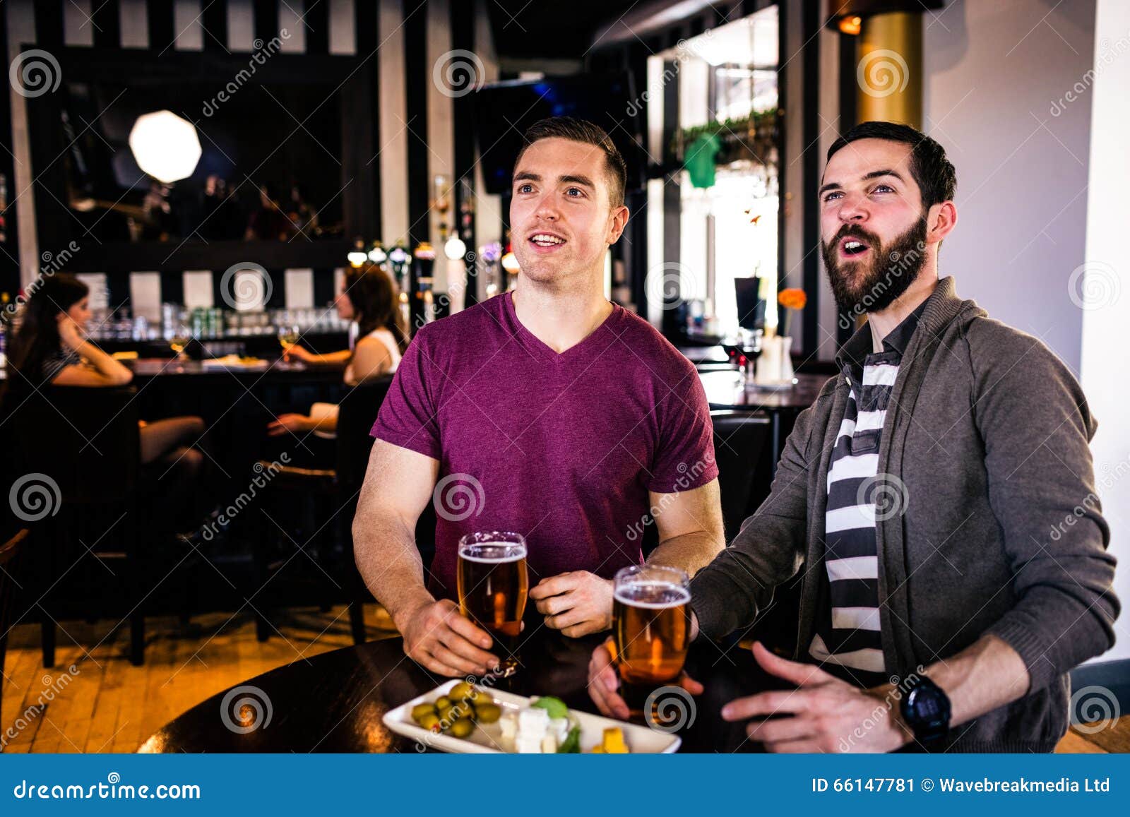 Friends having a pint stock image. Image of glass, alcohol - 66147781