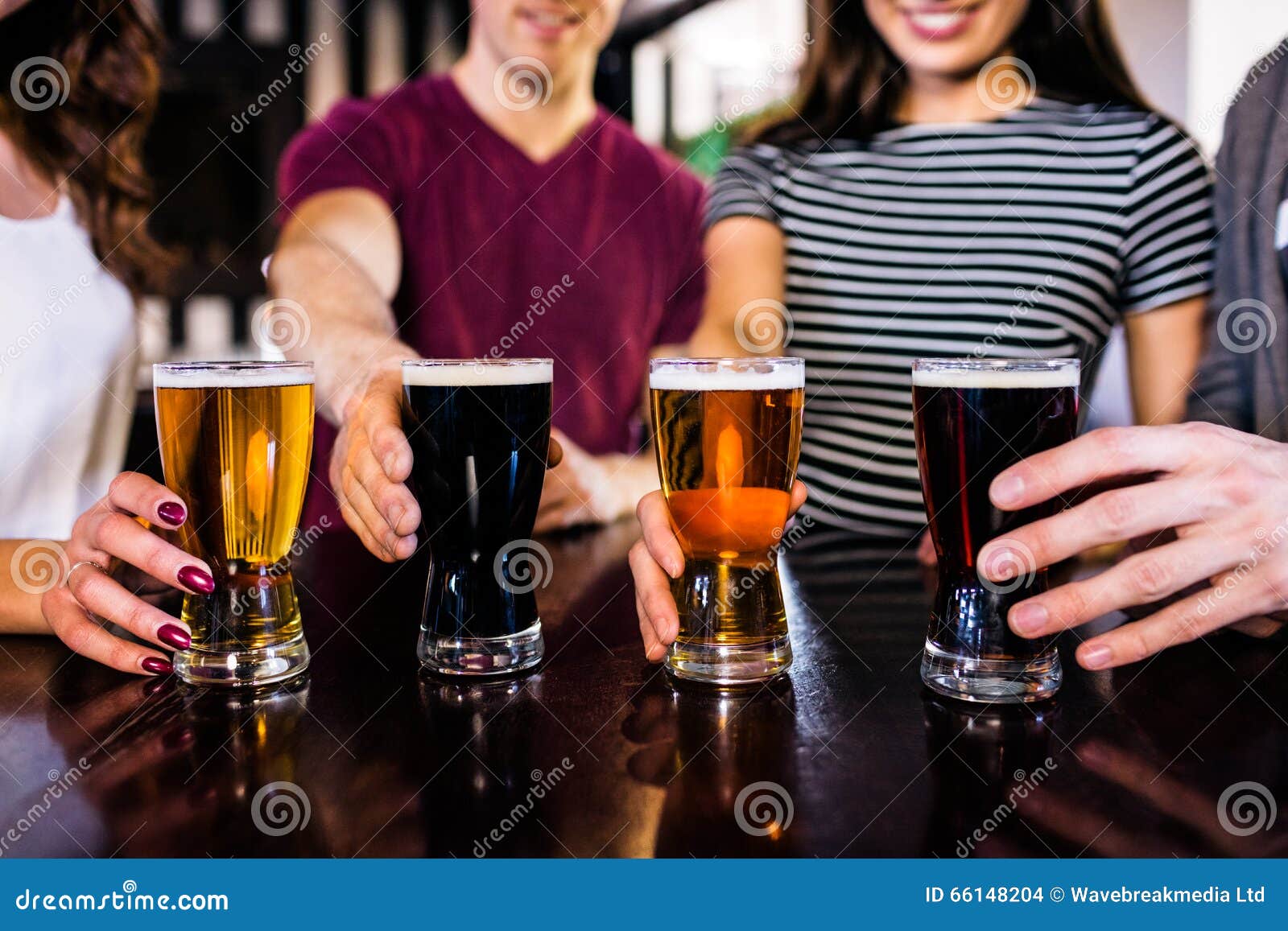 Friends having a pint stock photo. Image of caucasian - 66148204