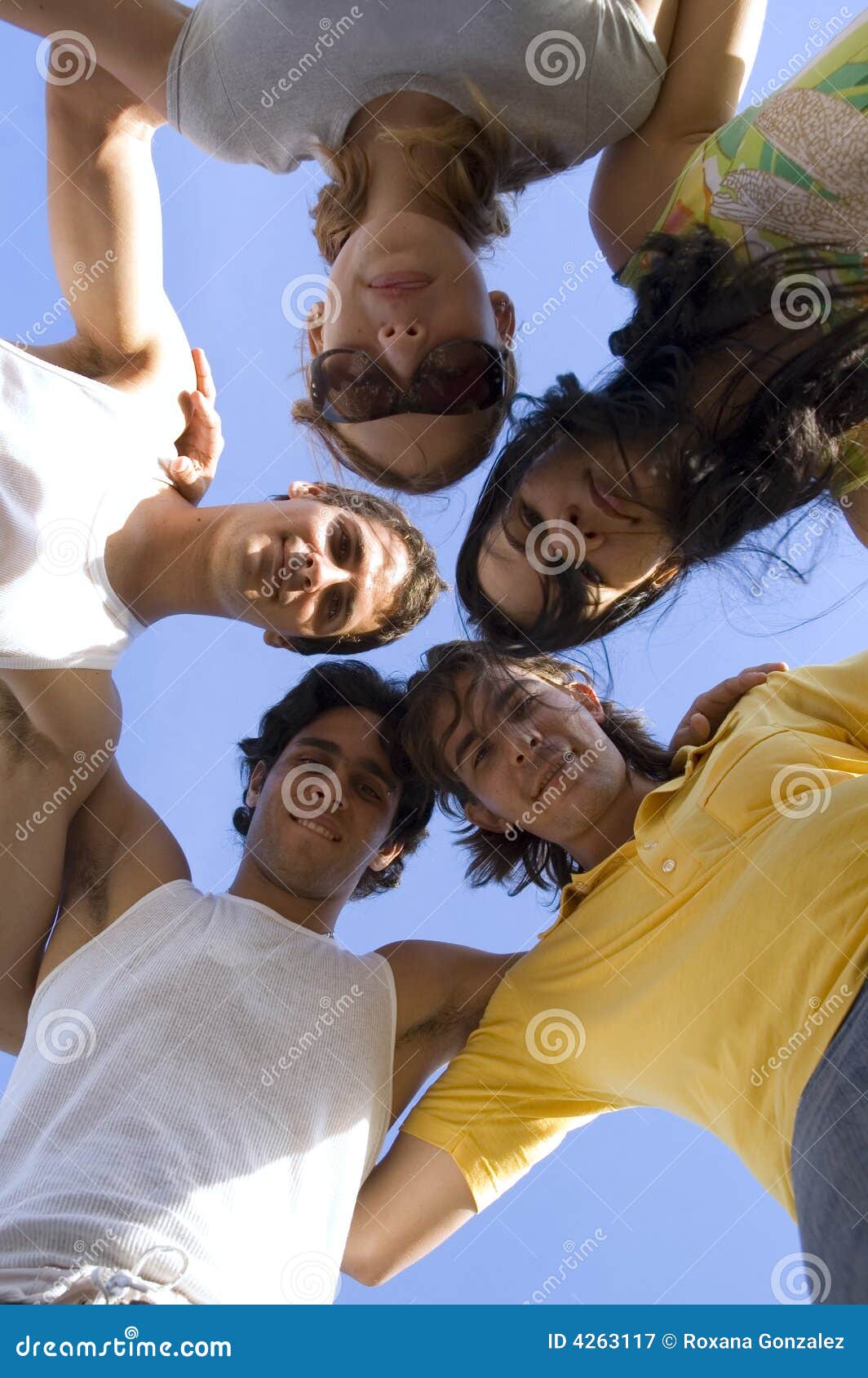 Friends with Heads Together Stock Image - Image of teamwork, teenagers ...