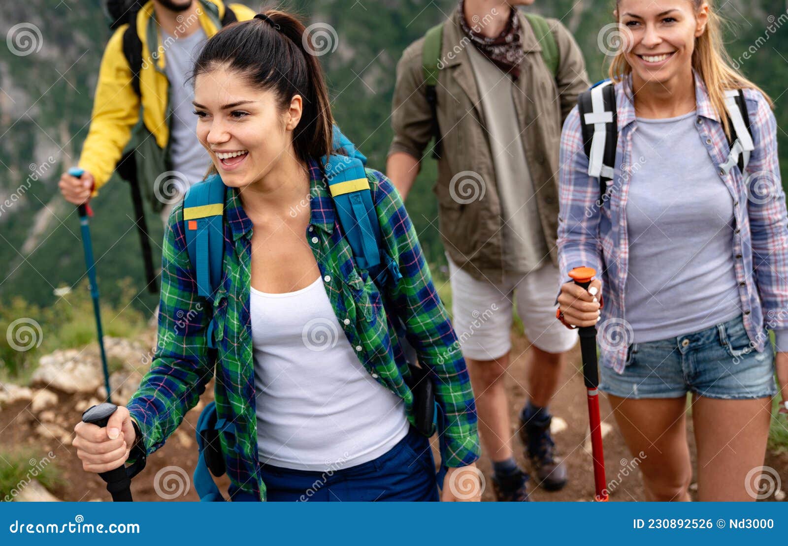 Group of Friends Hiking Together Outdoors Exploring the Wilderness and ...