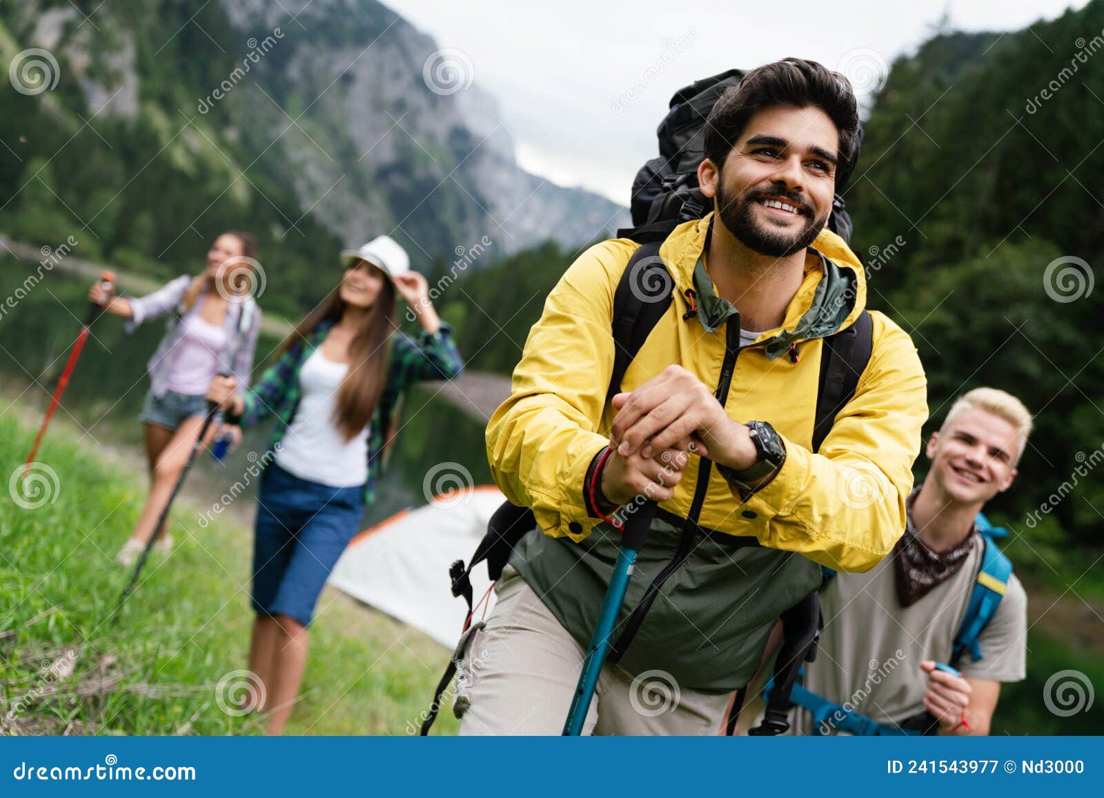 Group of Friends Hiking Together Outdoors Exploring the Wilderness and ...