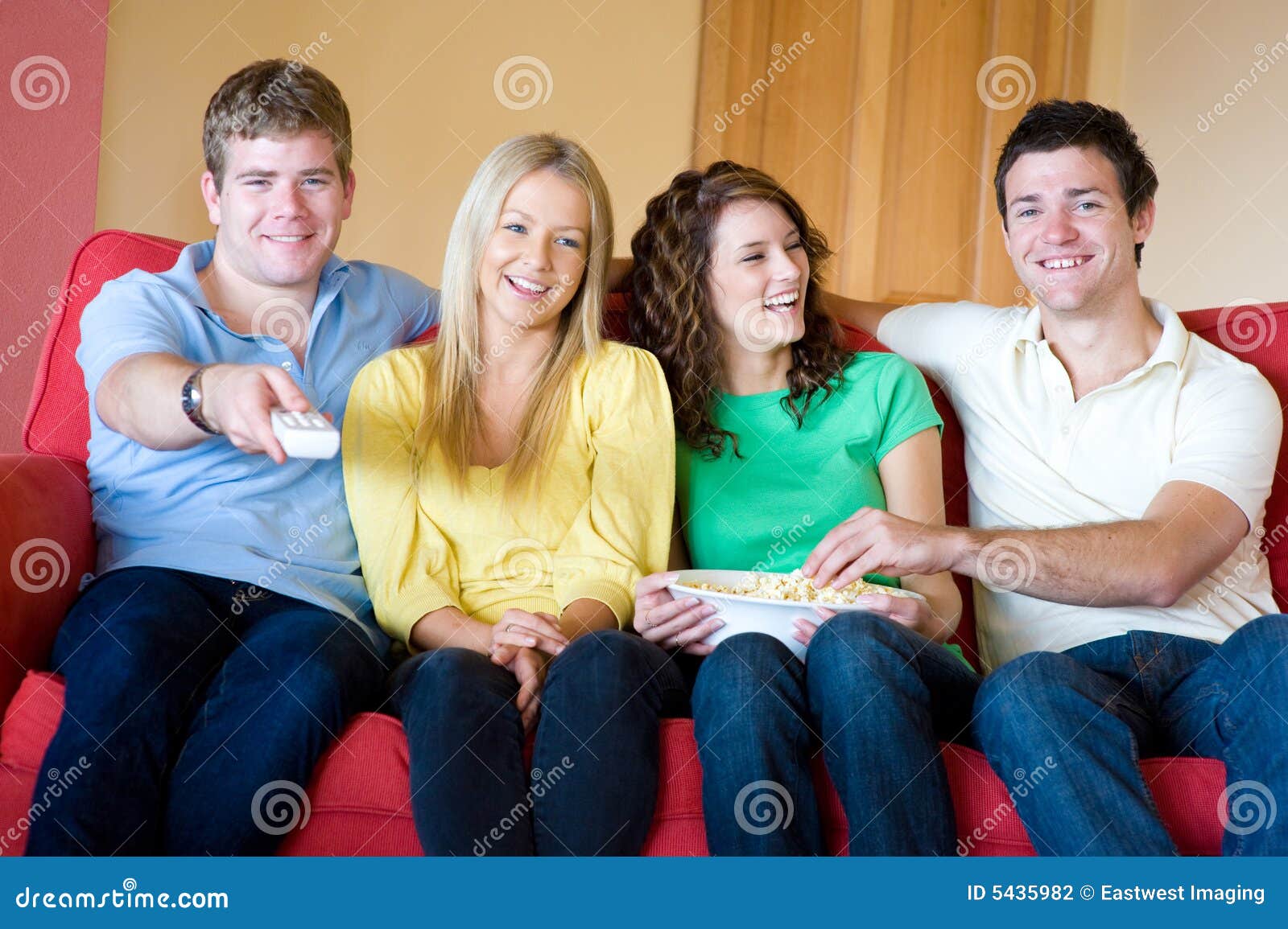 Friends at Home stock photo. Image of sofa, popcorn, remote - 5435982