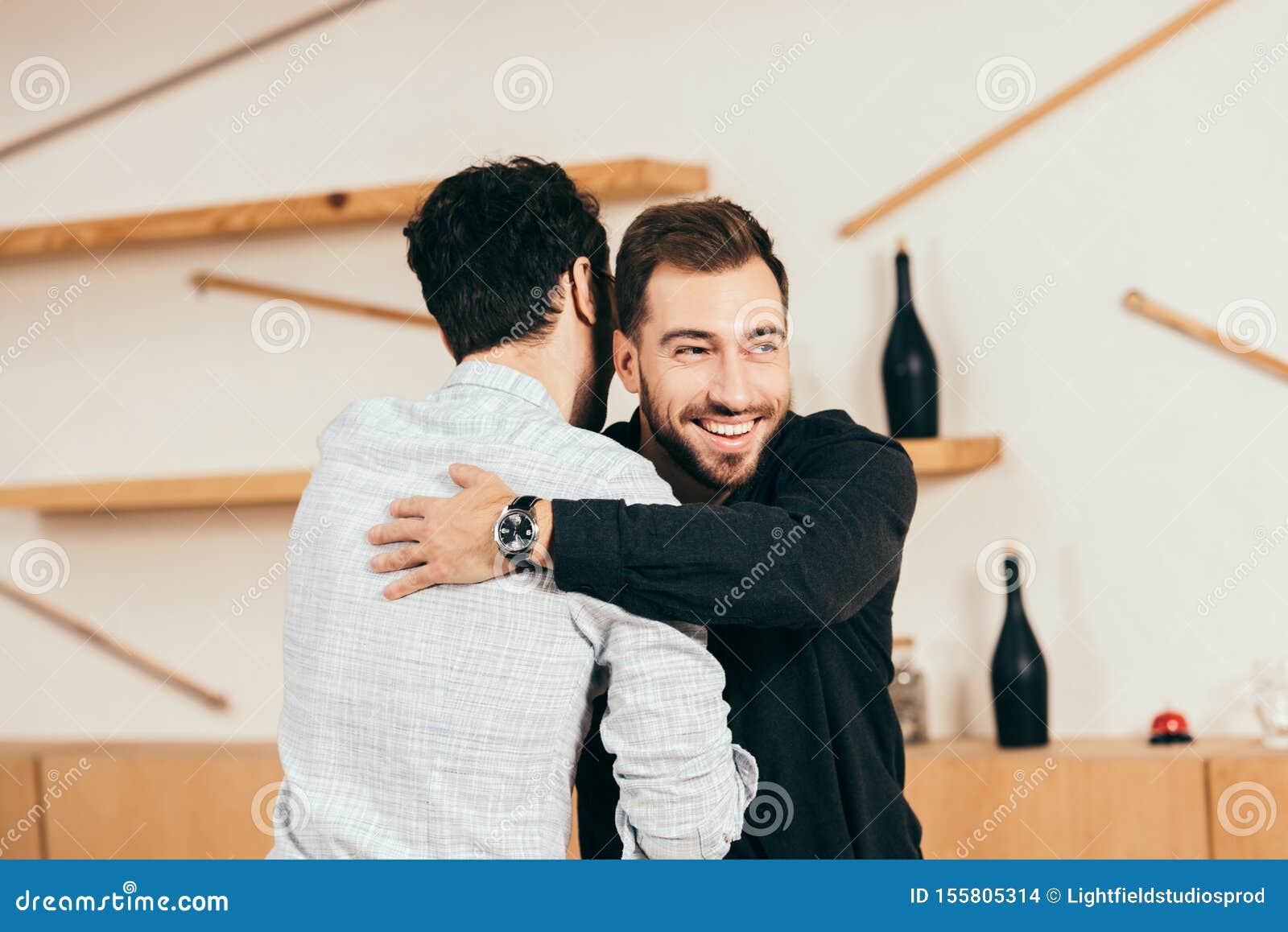 Friends Hugging while Greeting Each Other Stock Photo - Image of meet ...