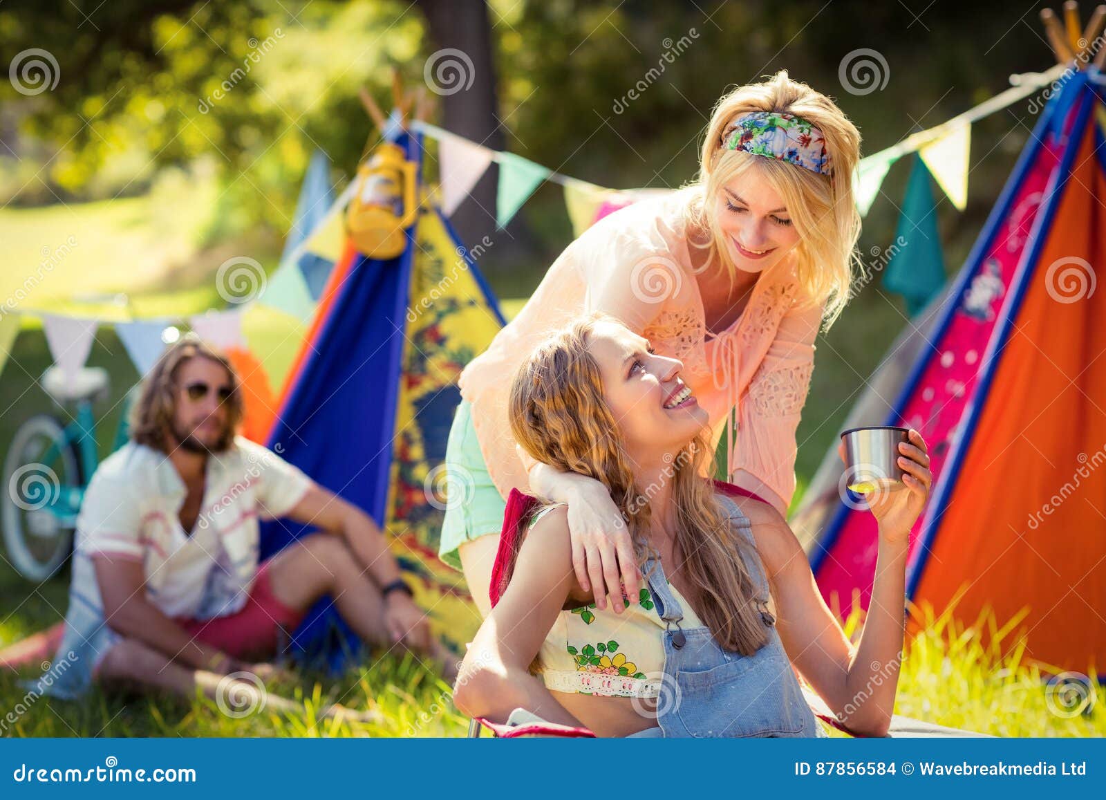 Friends Interacting with Each Other at Campsite Stock Photo - Image of ...