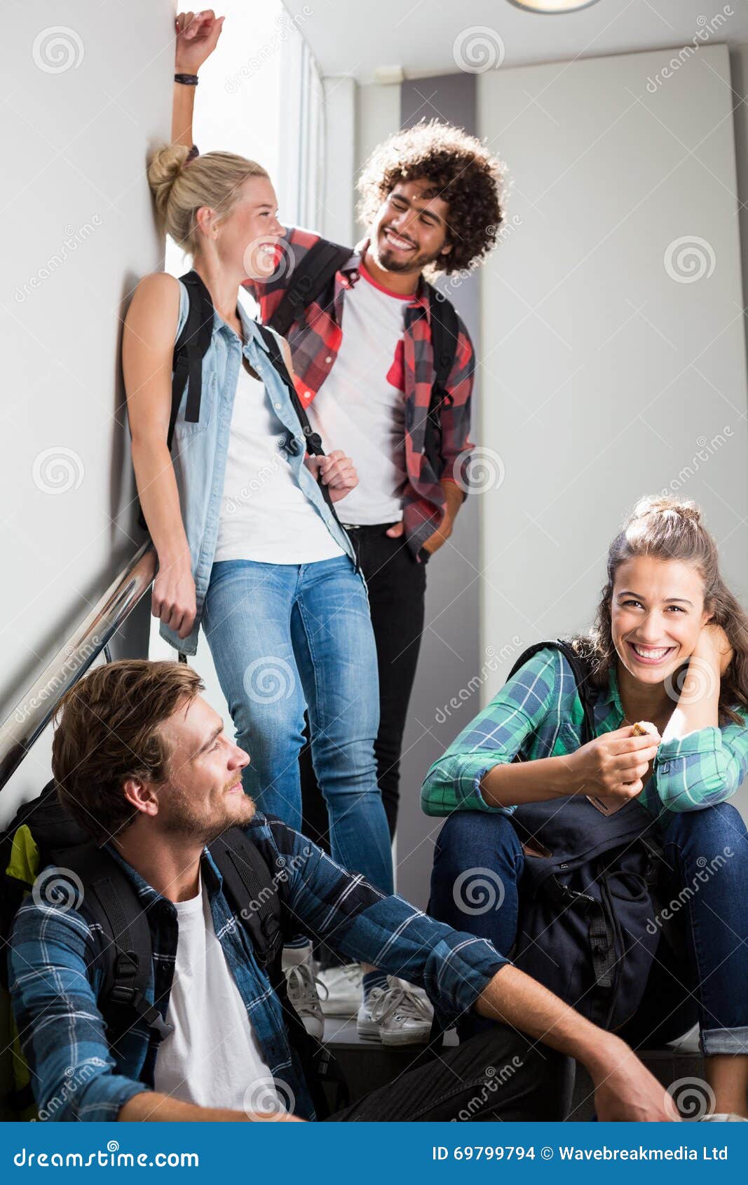 Friends Interacting on Staircase Stock Photo - Image of citylife ...