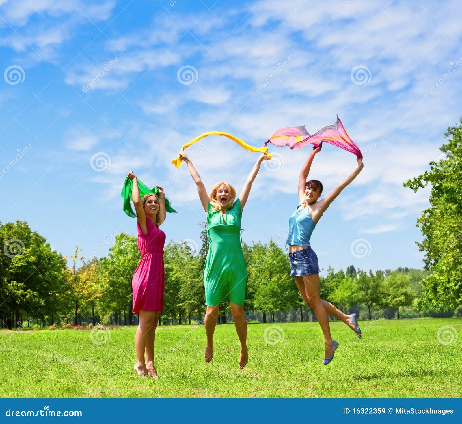 Friends jumping outdoors stock image. Image of carefree - 16322359
