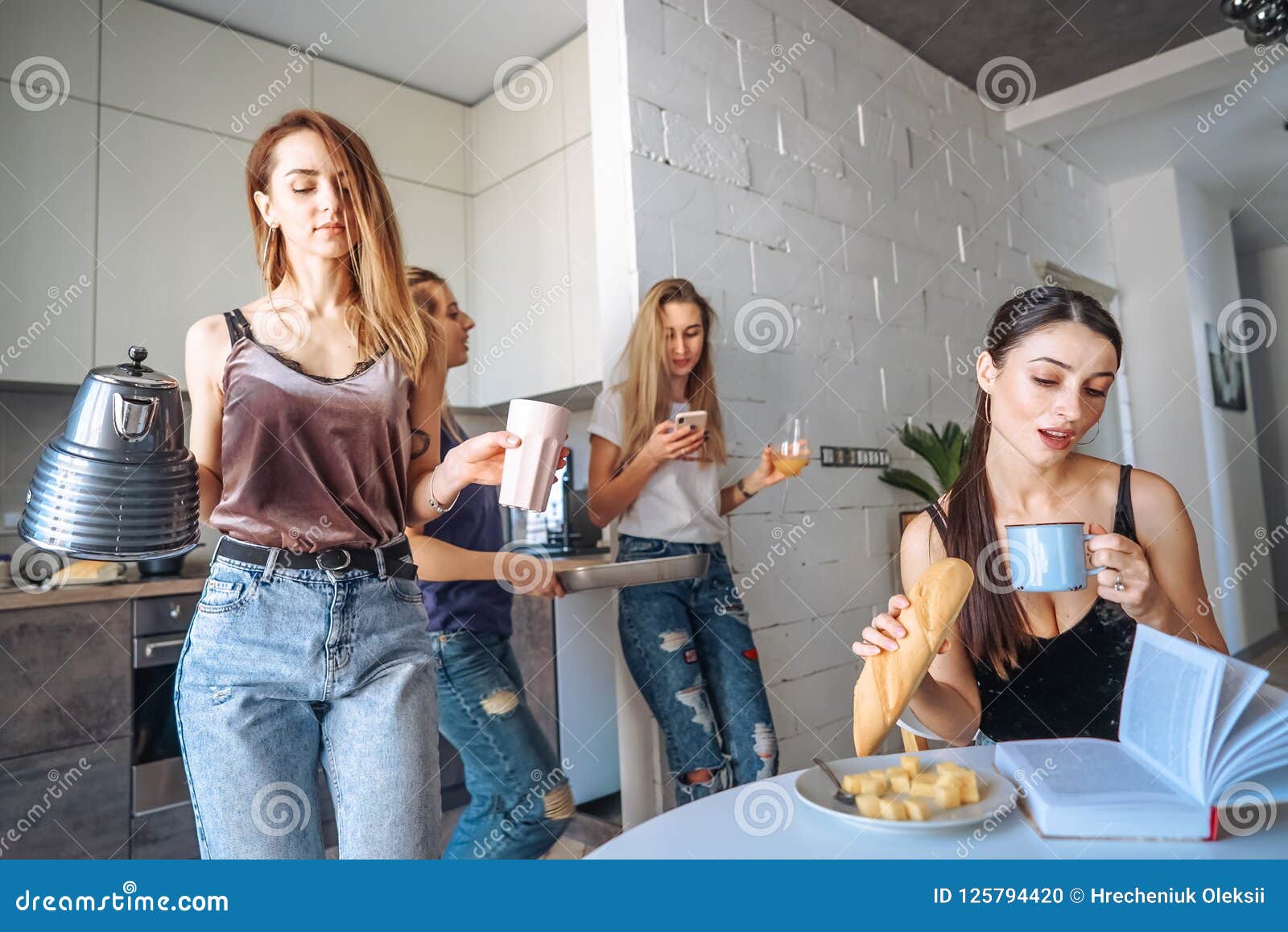 Friends in the kitchen stock photo. Image of meal, happy - 125794420