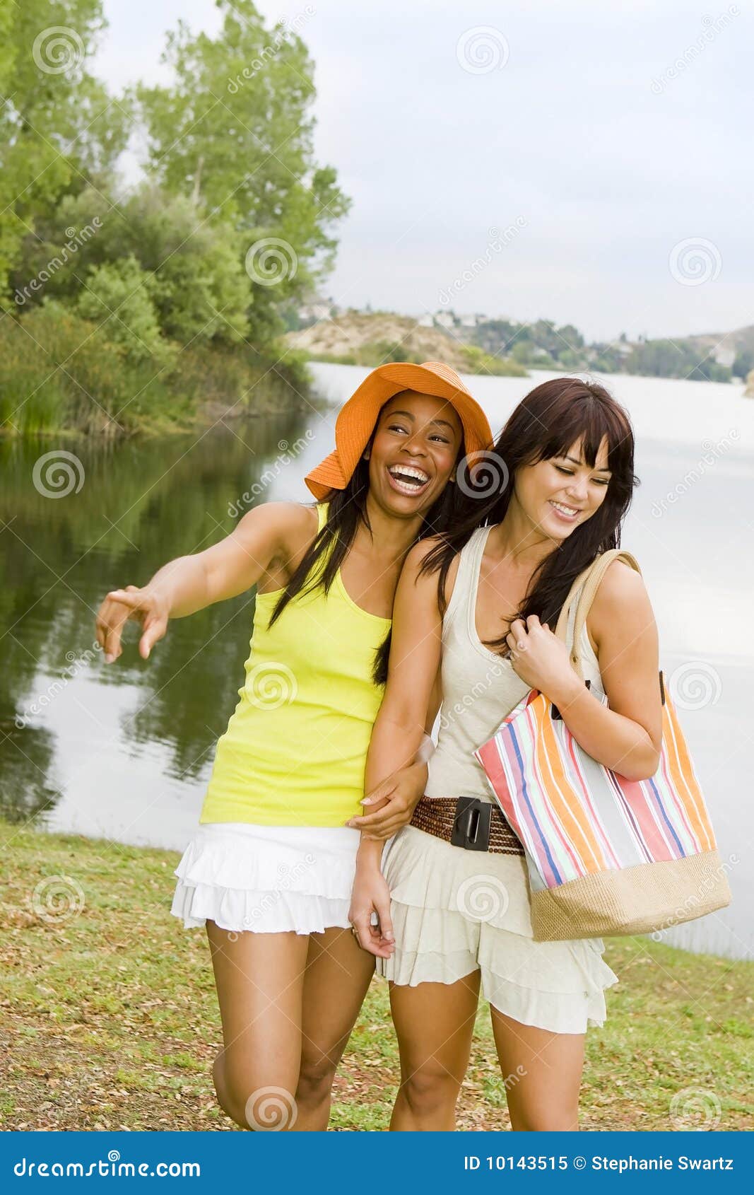Friends at the lake stock image. Image of ocean, lake - 10143515