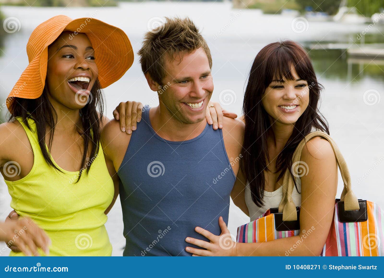 Friends at the lake stock image. Image of ocean, body - 10408271