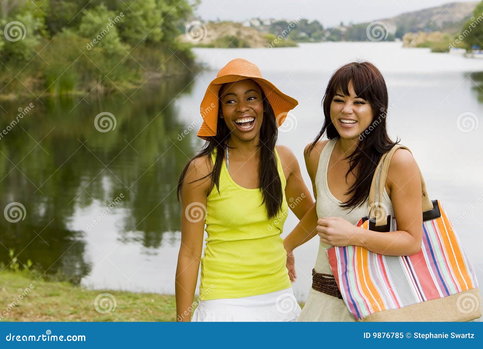 Friends at the lake stock image. Image of physical, beautiful - 9876785