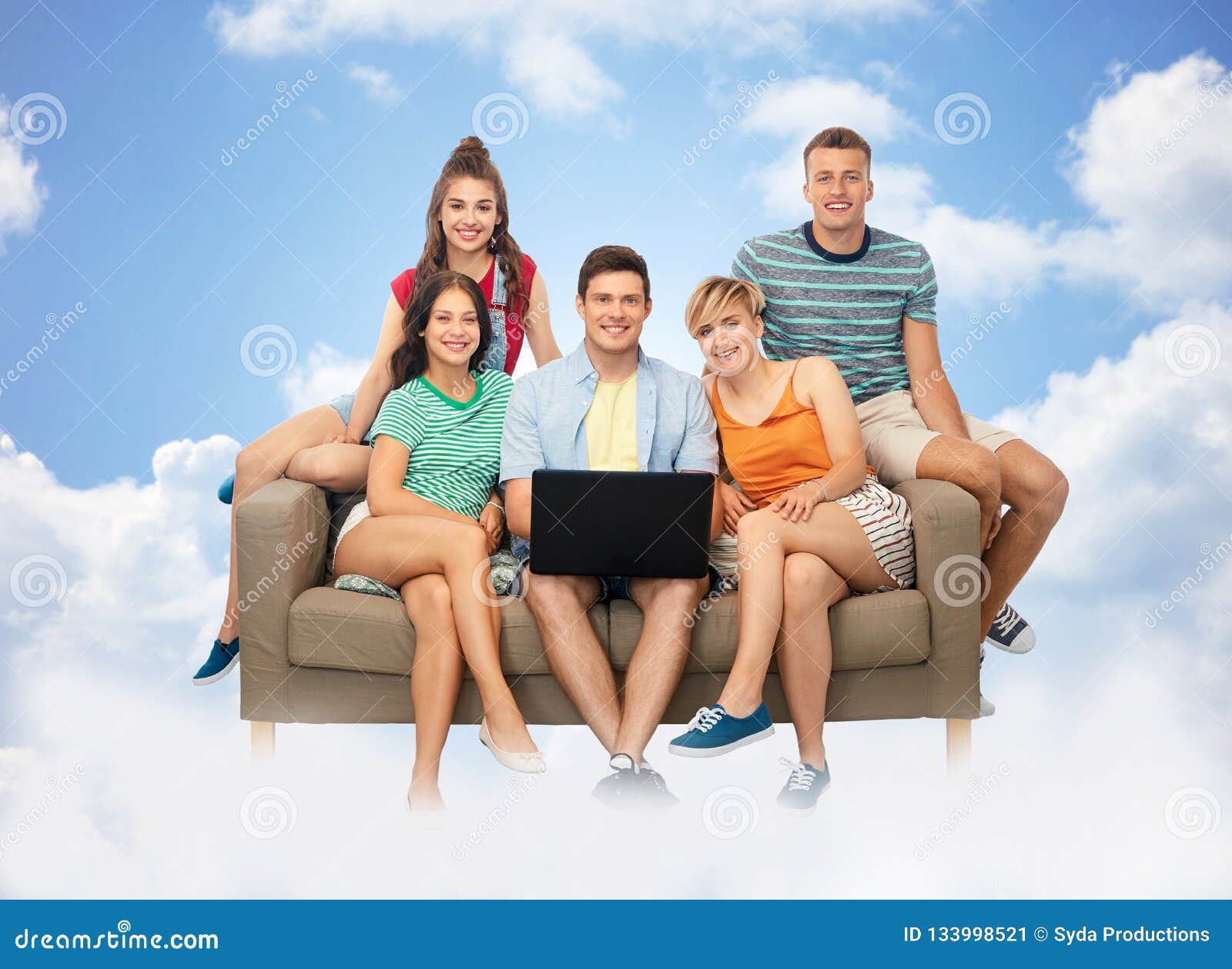 Friends with Laptop Computer on Sofa Over Clouds Stock Image - Image of ...