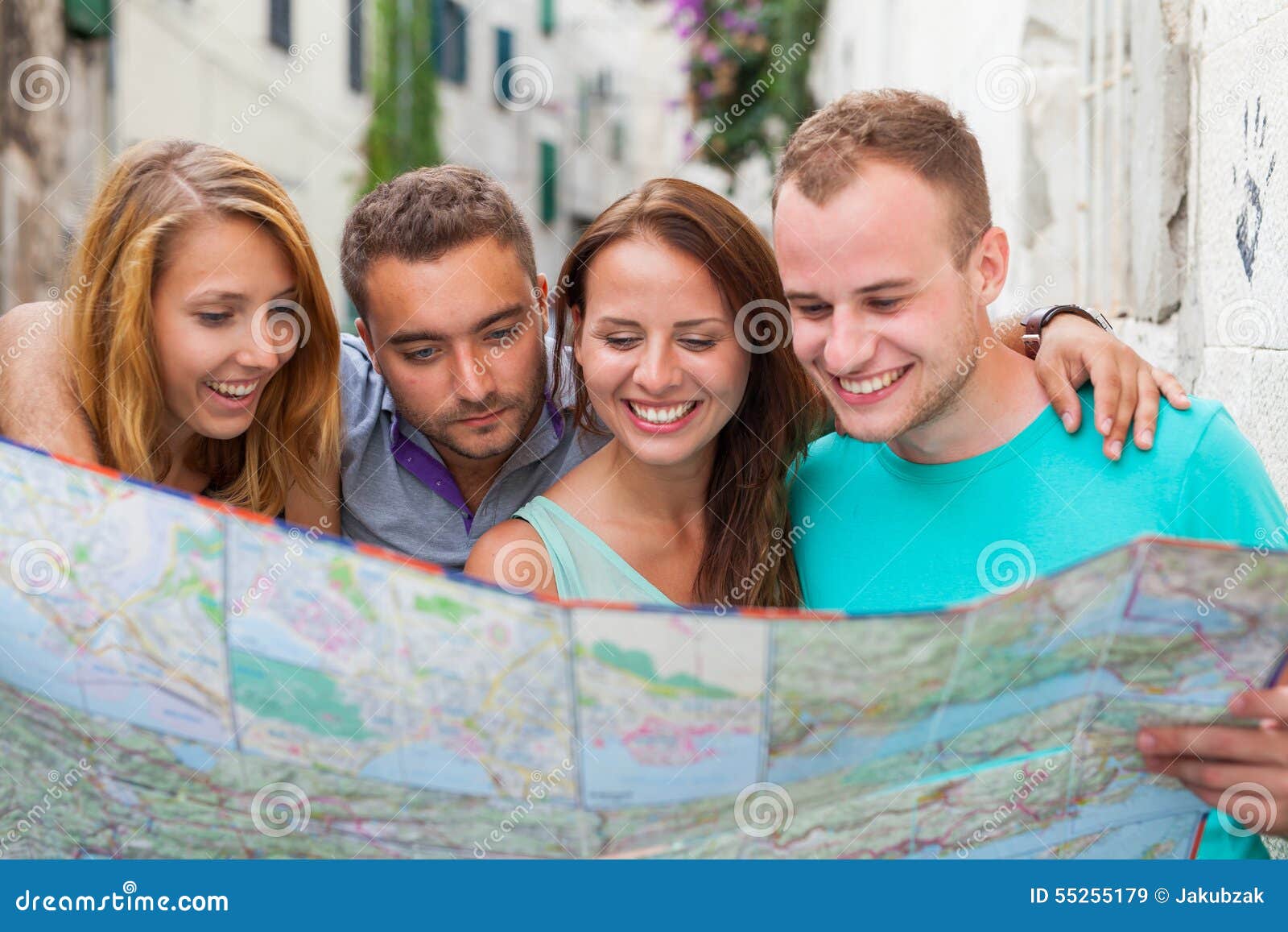 Friends Loking on the Map on the Street. they are on Holidays. Stock ...