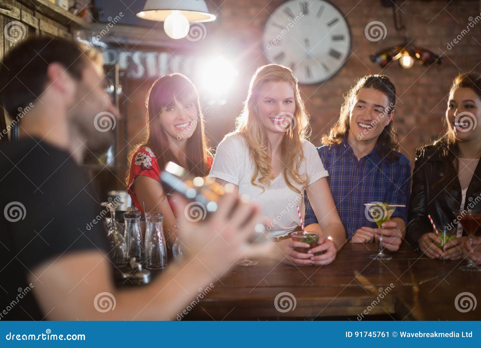Friends Looking at Bartender Making Drinks Stock Image - Image of ...