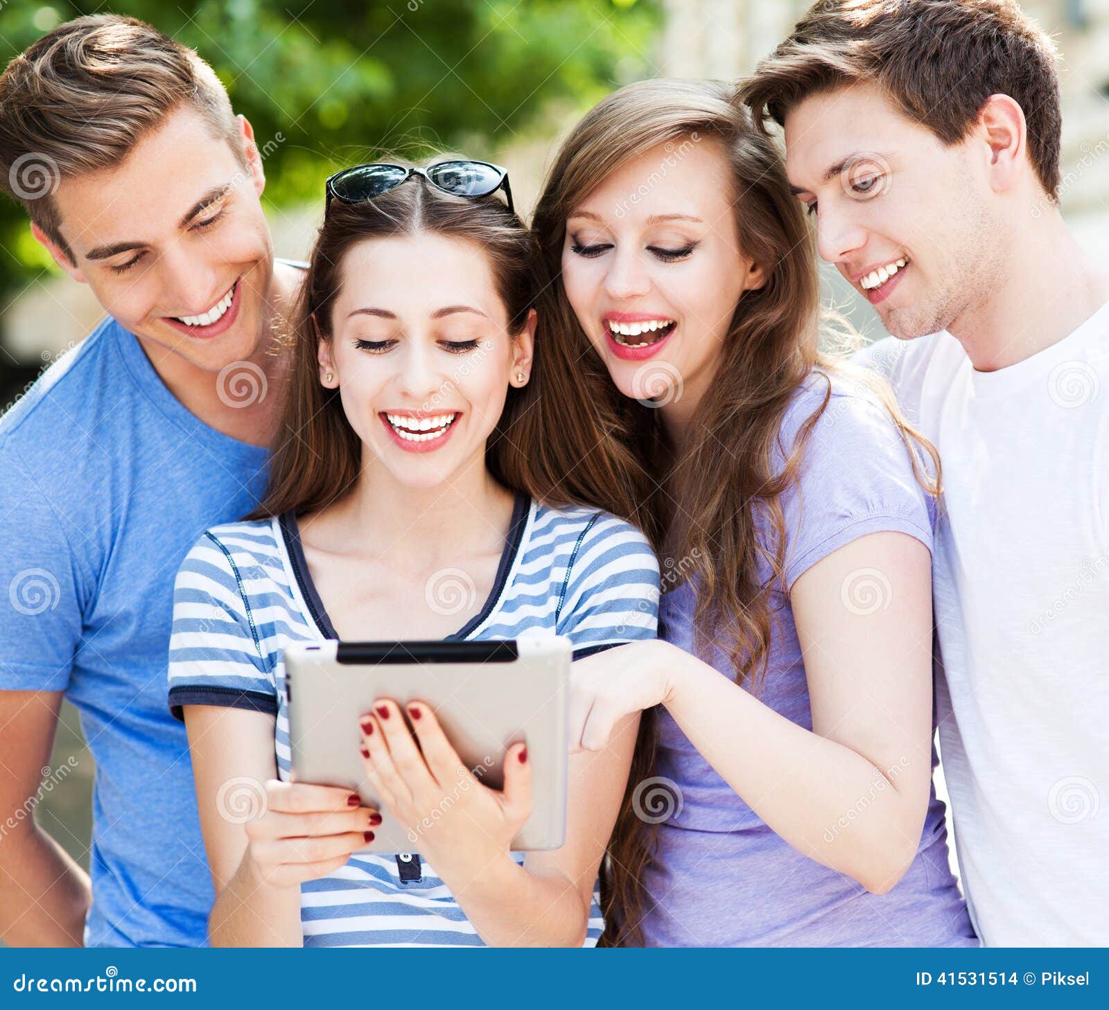Friends Looking at Digital Tablet Stock Photo - Image of carefree ...
