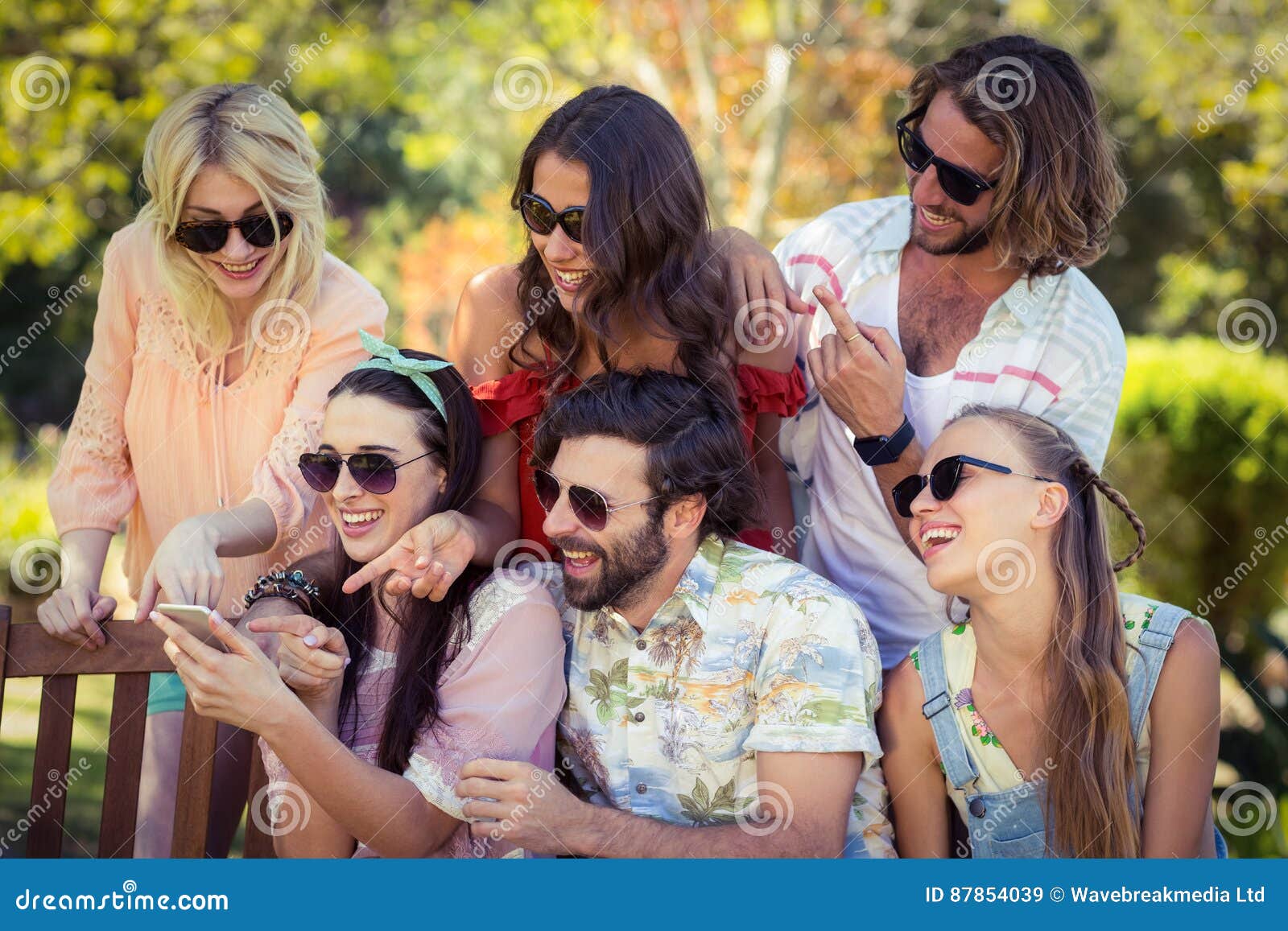 Friends Looking at Mobile Phone Stock Image - Image of looking ...