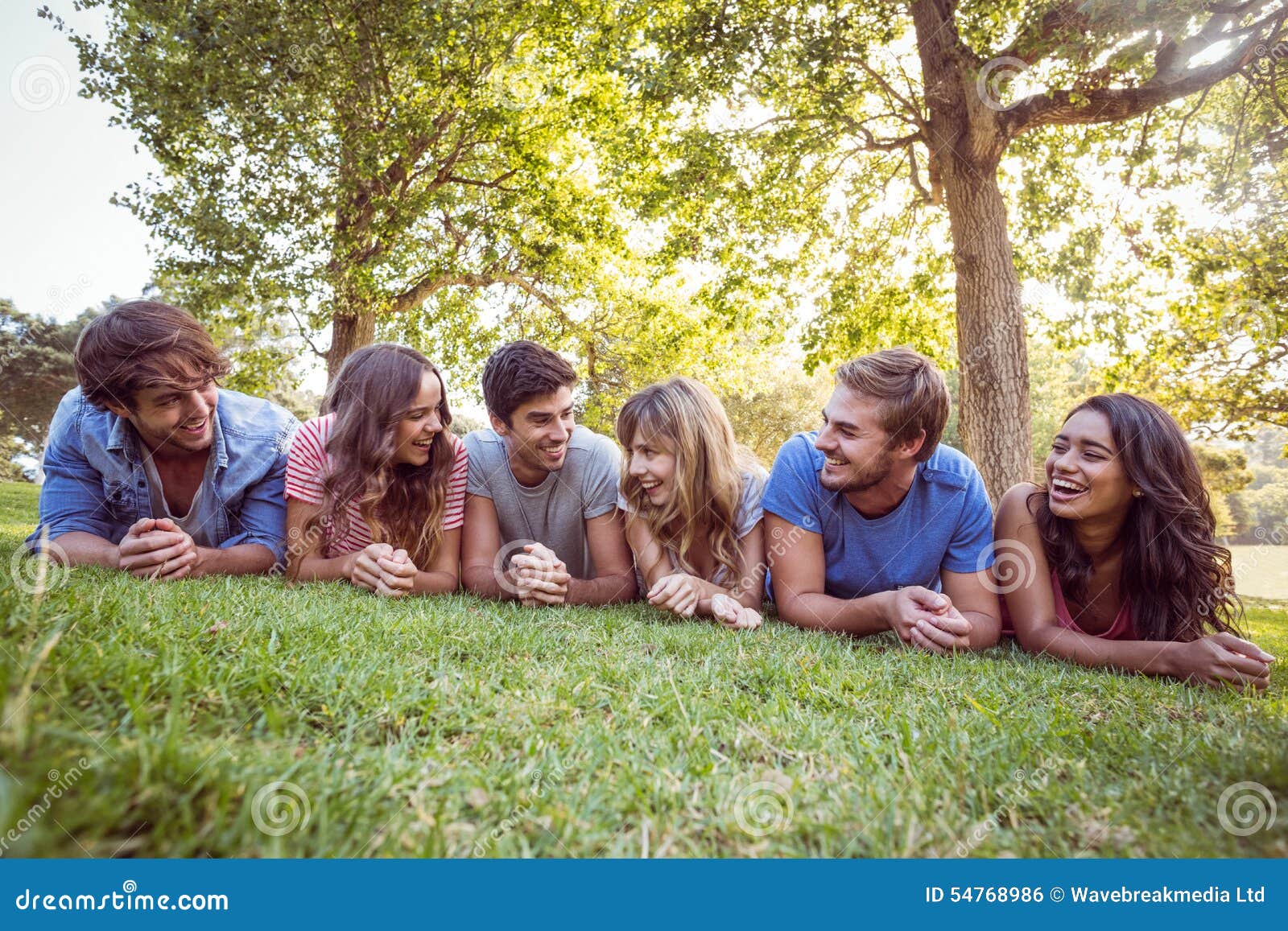 Friends Lying and Talking in the Park Stock Photo - Image of hair ...