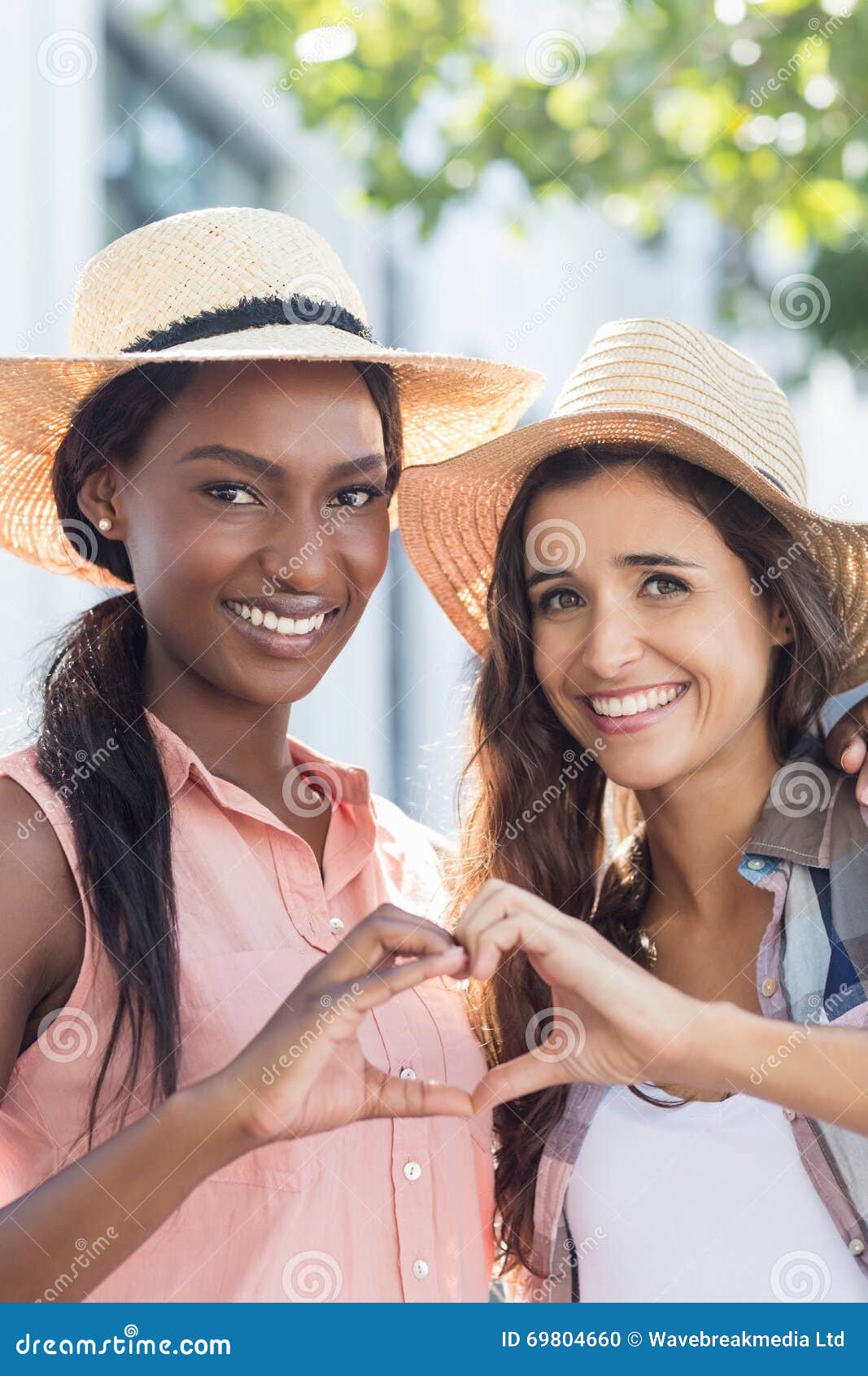 Friends Making Heart Shape with Hands Stock Photo - Image of ...