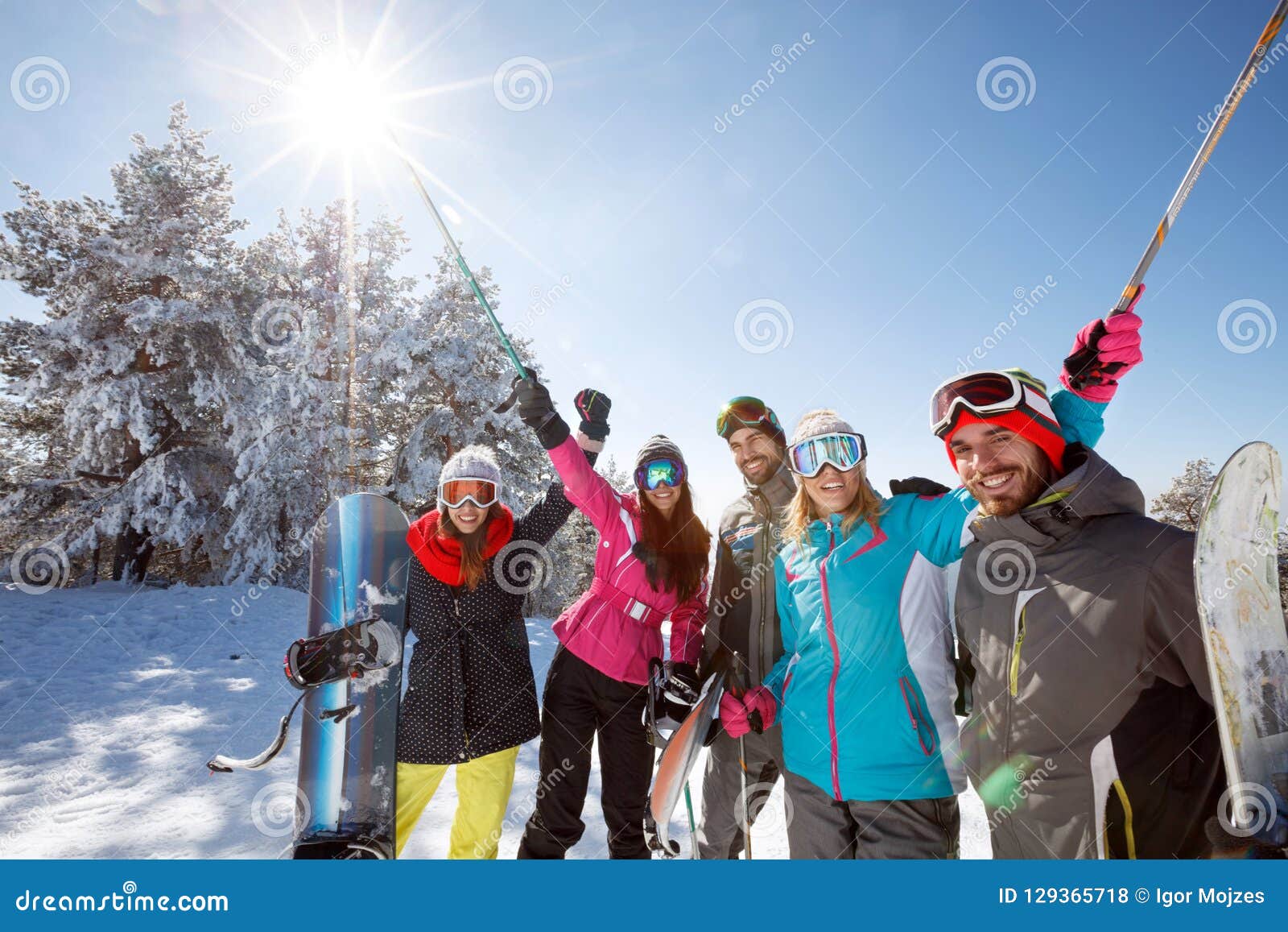 Friends on mountain skiing stock photo. Image of skis - 129365718