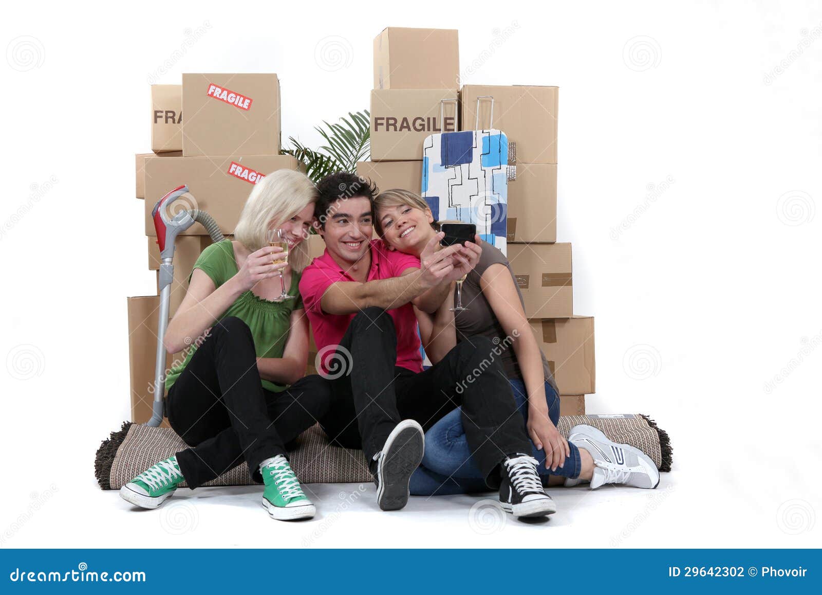 Friends moving in together stock photo. Image of residence - 29642302