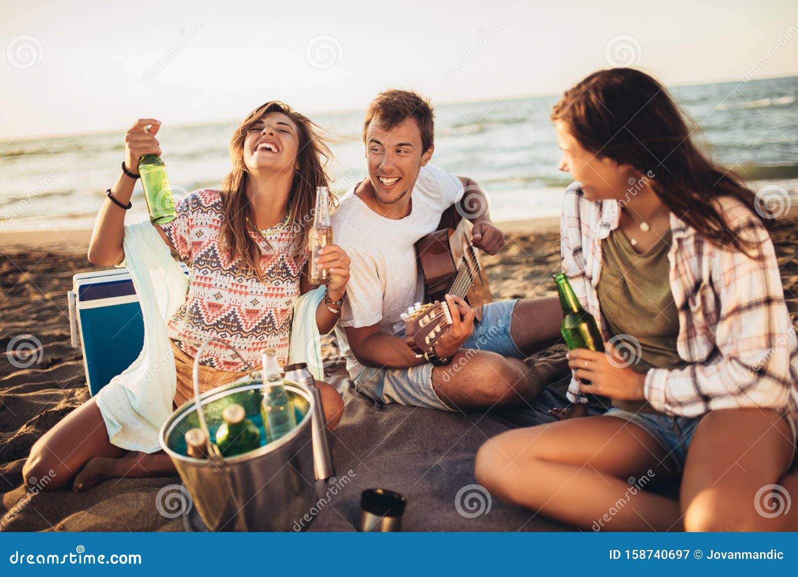Friends Partying on the Beach with Drinks Stock Image - Image of ...