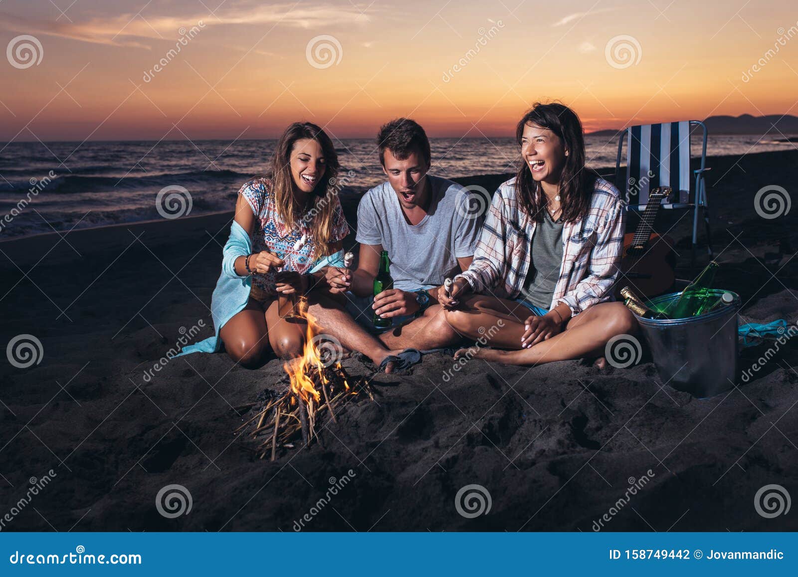 Friends Partying on the Beach with Drinks Stock Photo - Image of ...