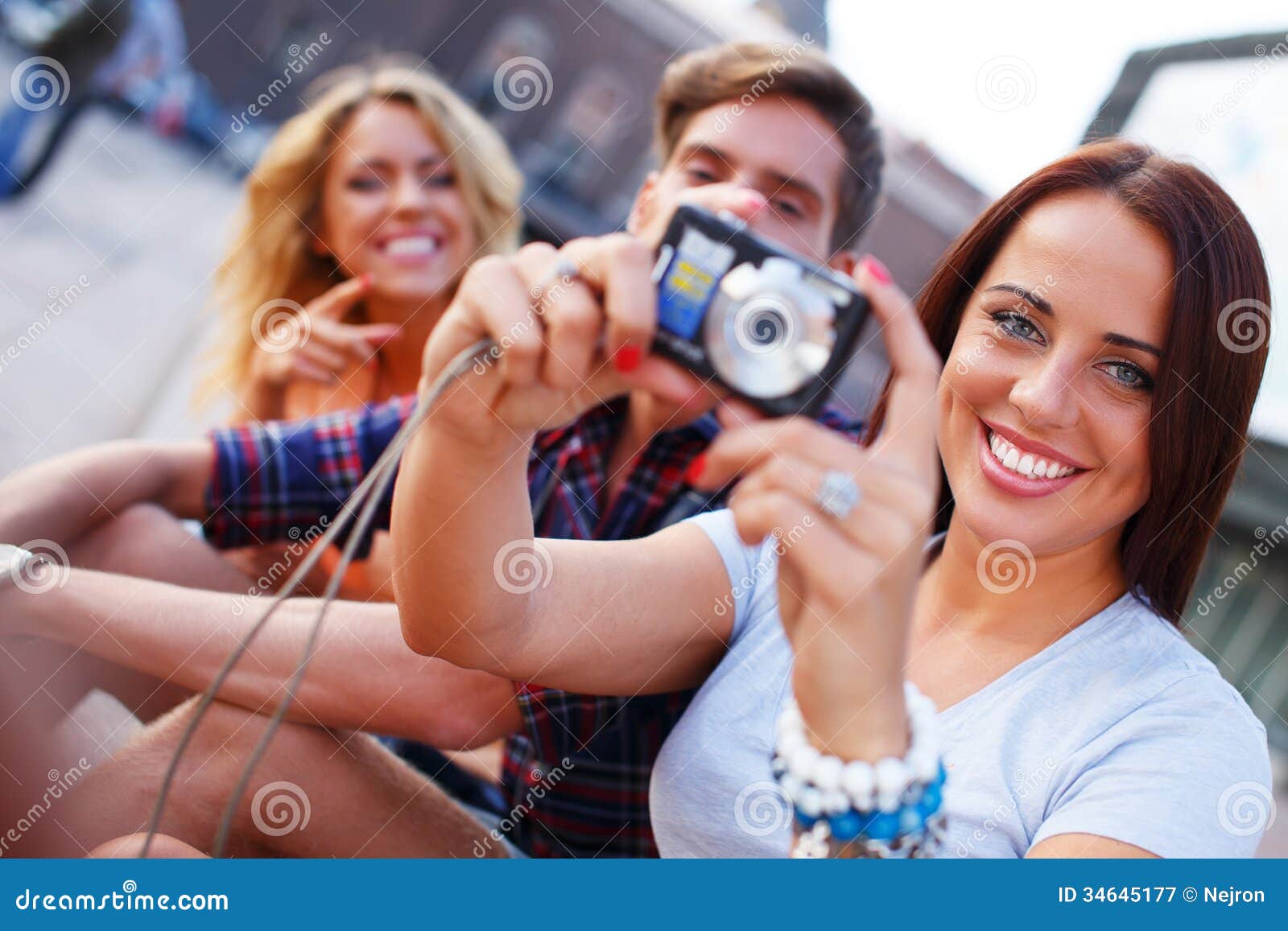 Friends with photo camera stock image. Image of casual - 34645177