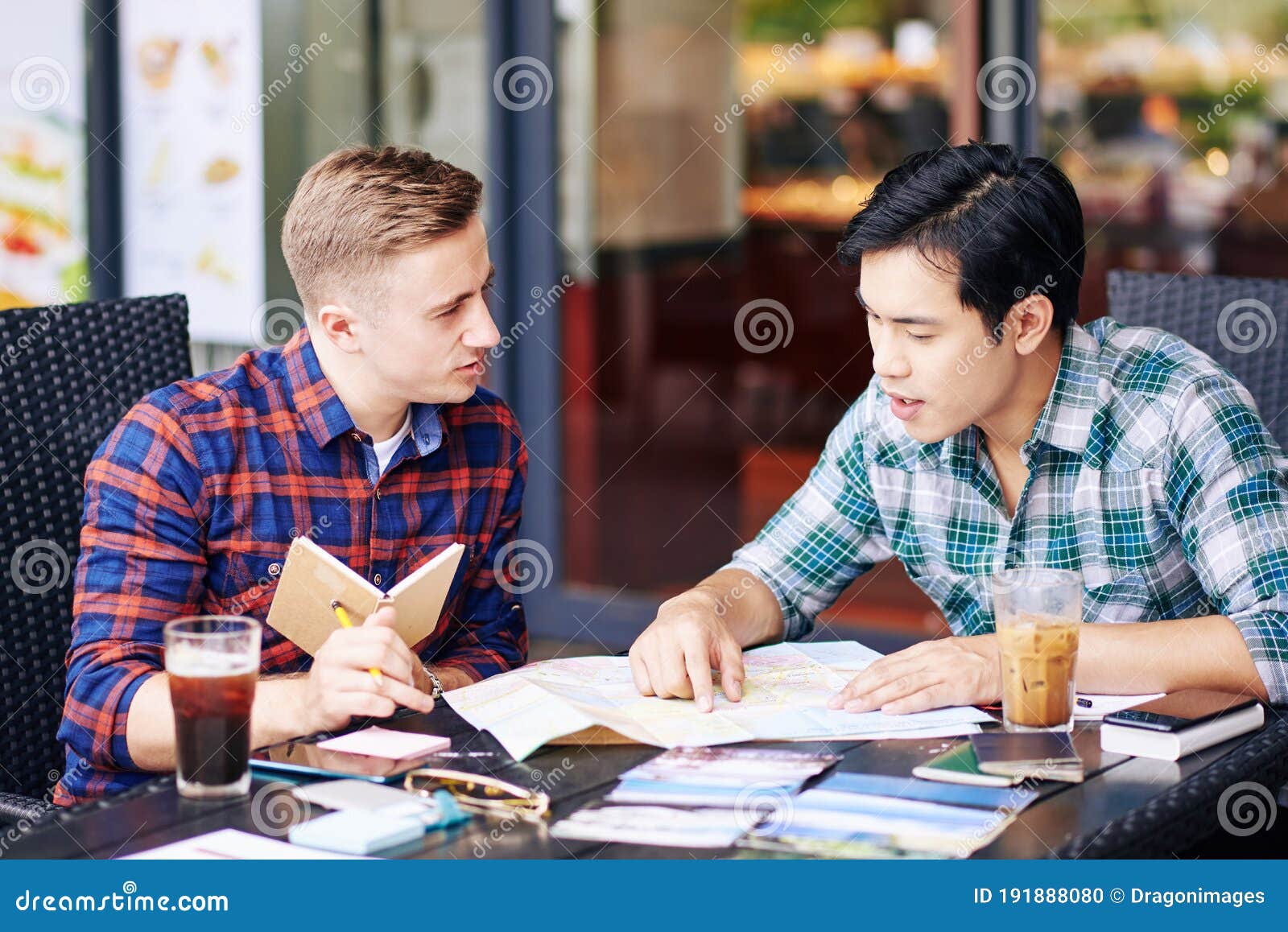 Friends Planning Summer Vacation Stock Photo - Image of discussion ...