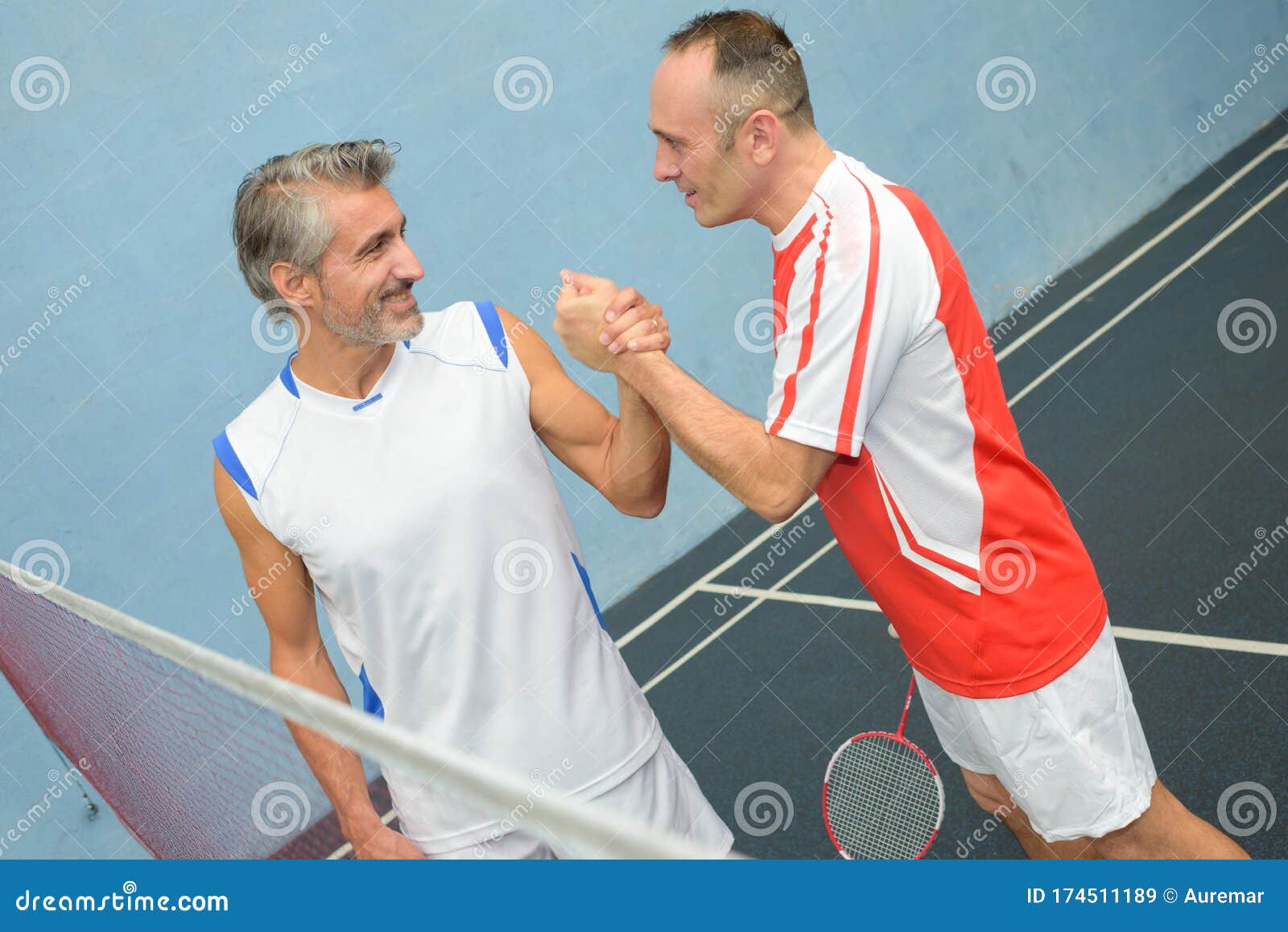 Friends playing badminton stock image. Image of play - 174511189